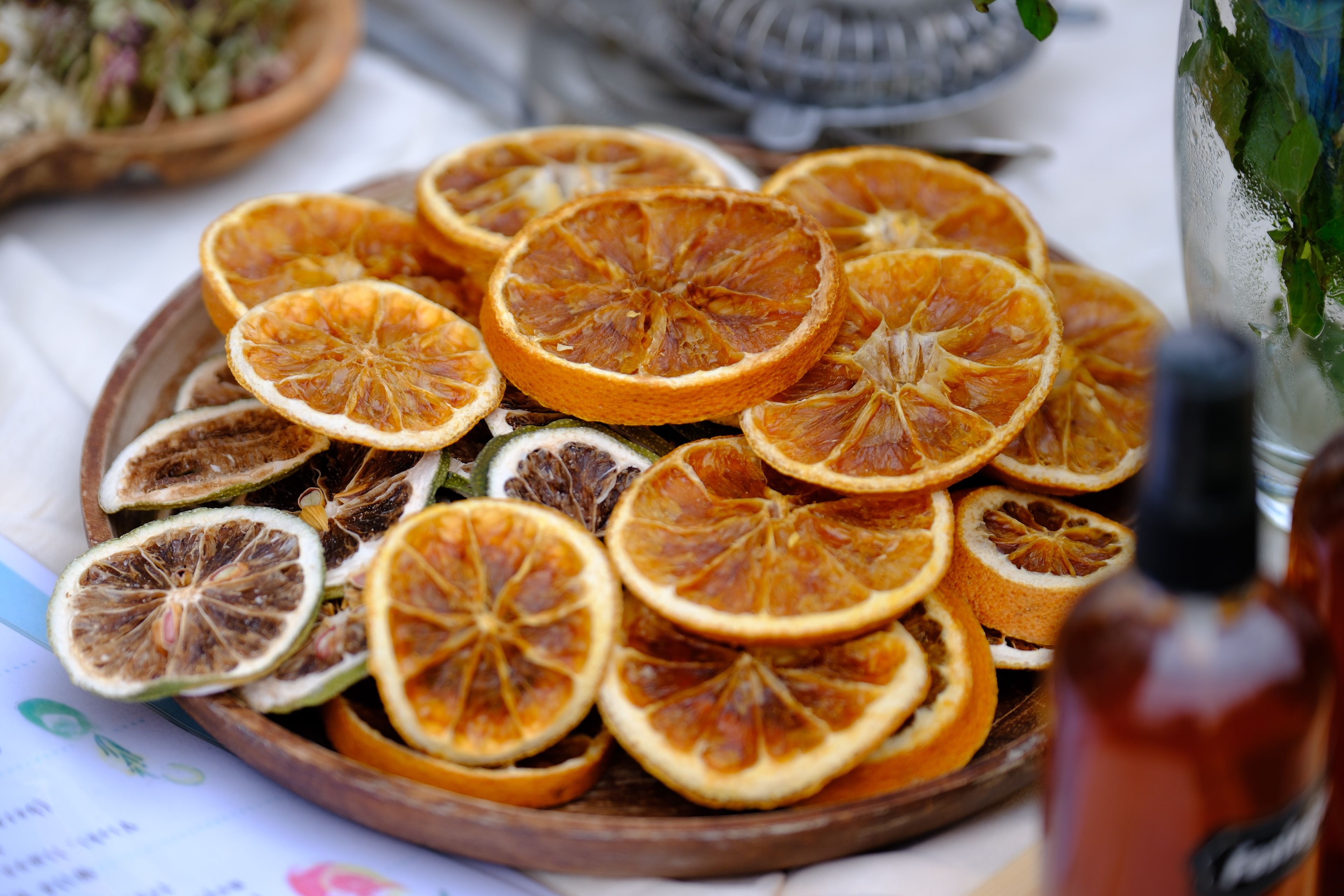 Close-up of Dried Citrus Slices on a Platter · Free Stock Photo