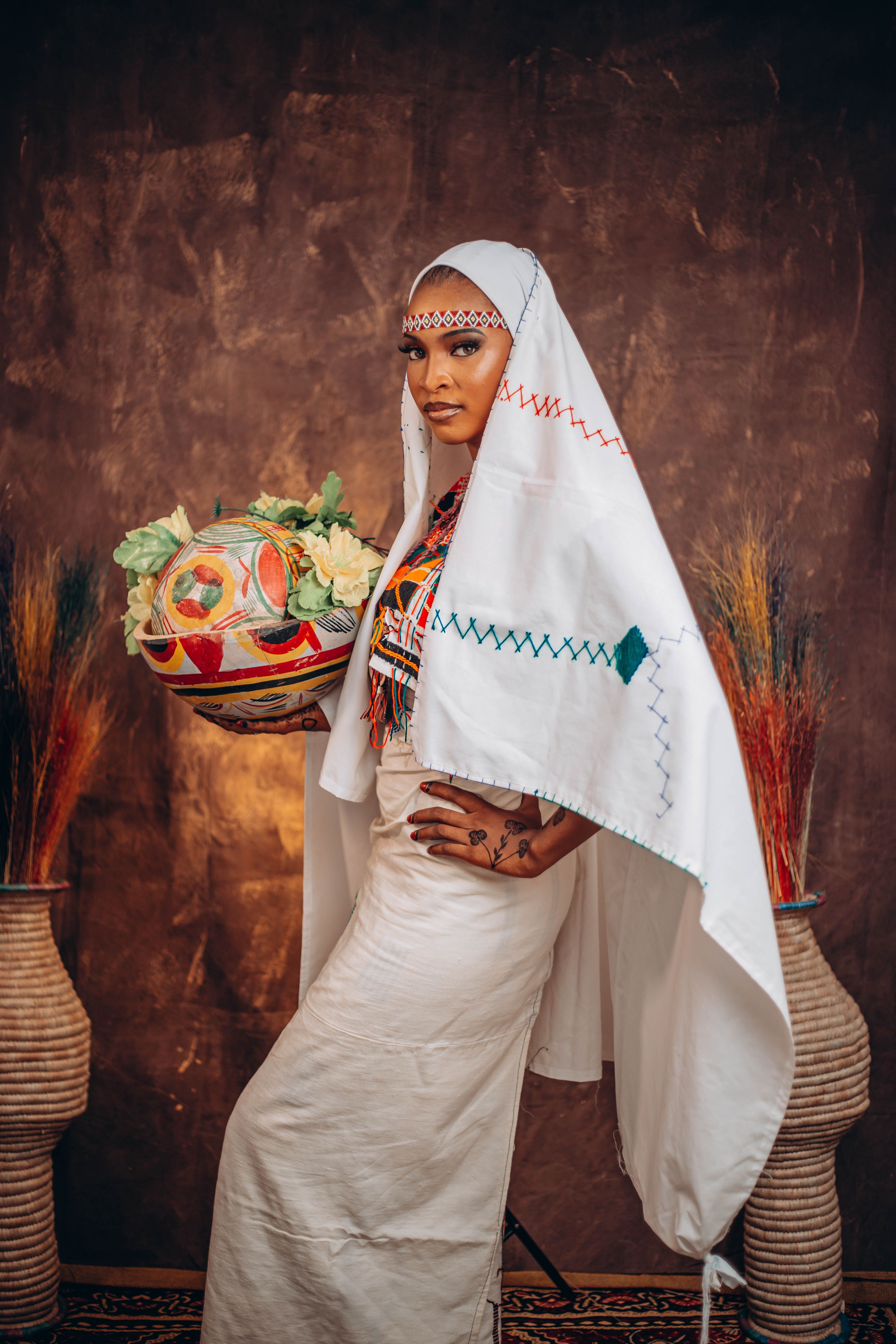 Woman Posing in Traditional Clothing and with Bowl · Free Stock Photo