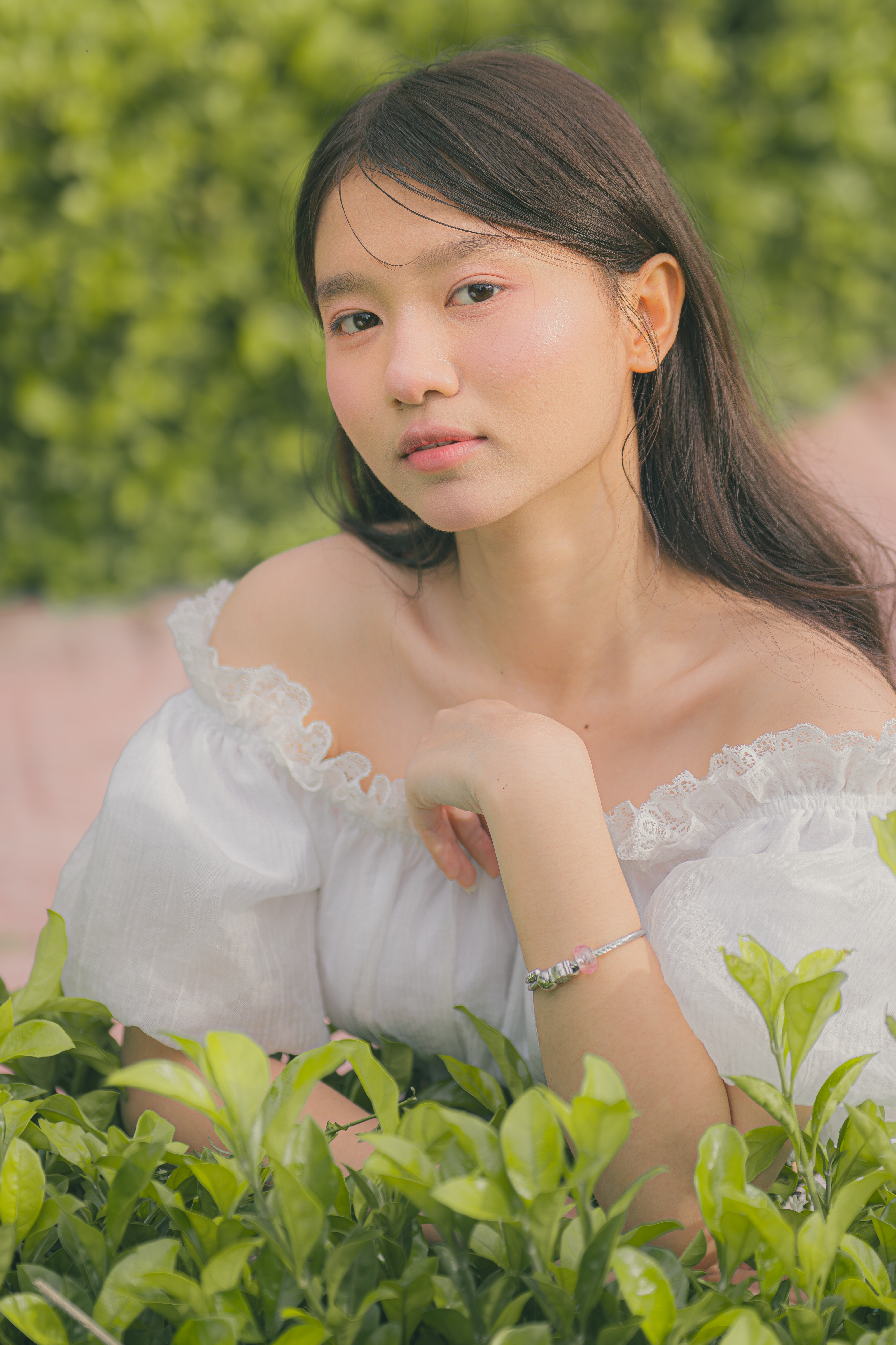 Portrait of Young Woman in Garden Setting · Free Stock Photo