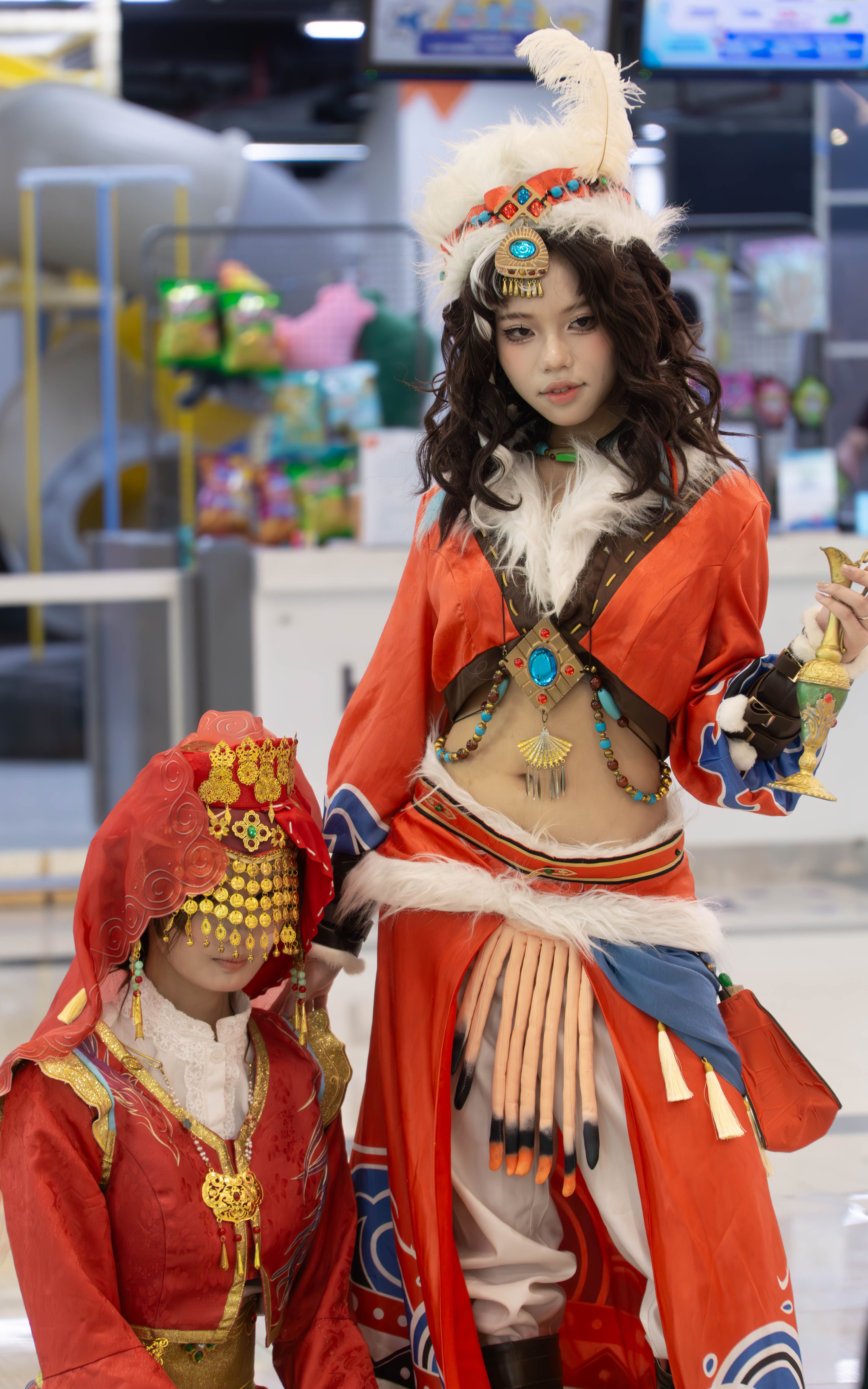 Colorful Traditional Costume Exhibition Indoors · Free Stock Photo
