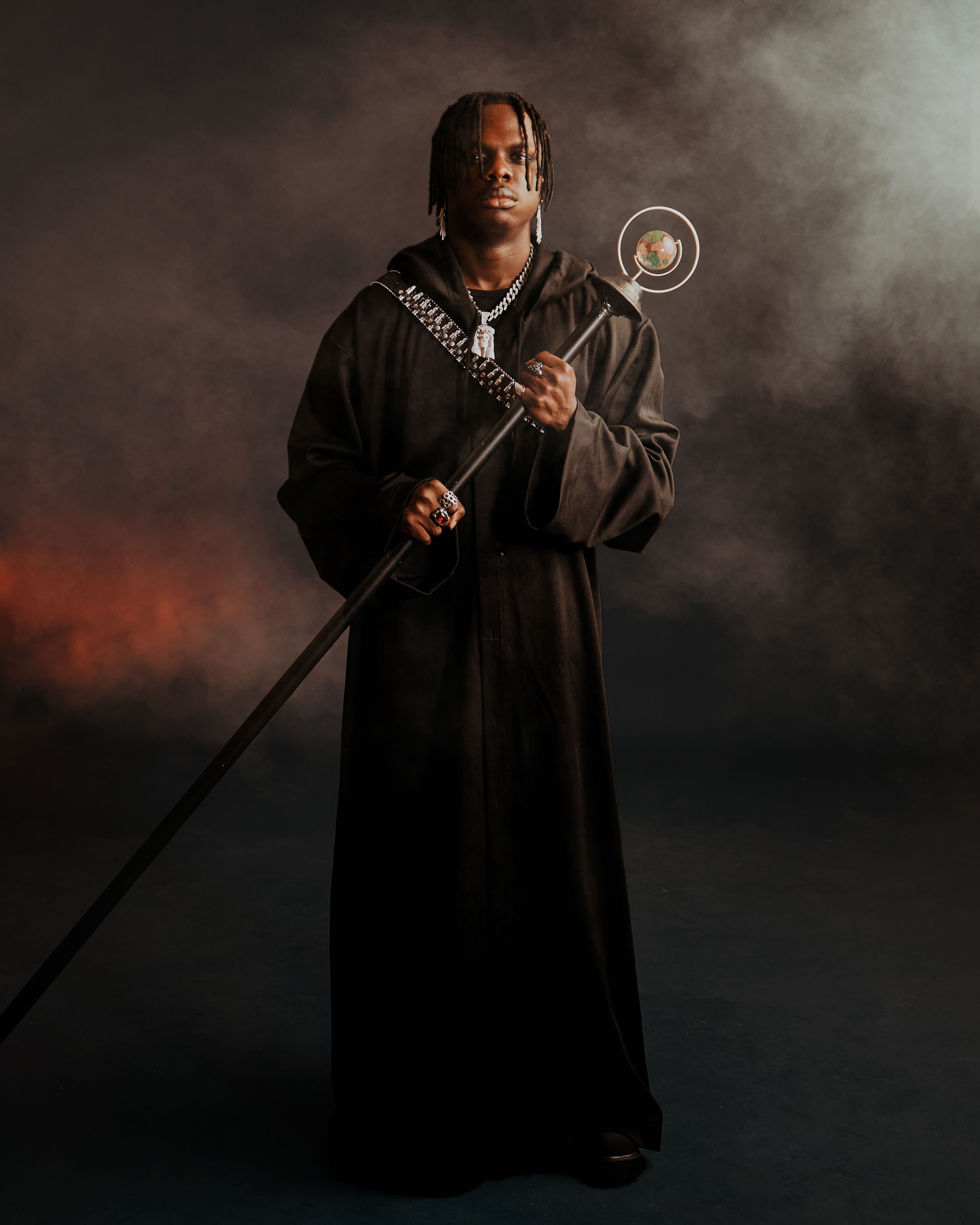 Mystical Portrait of a Man in Robe with Staff · Free Stock Photo