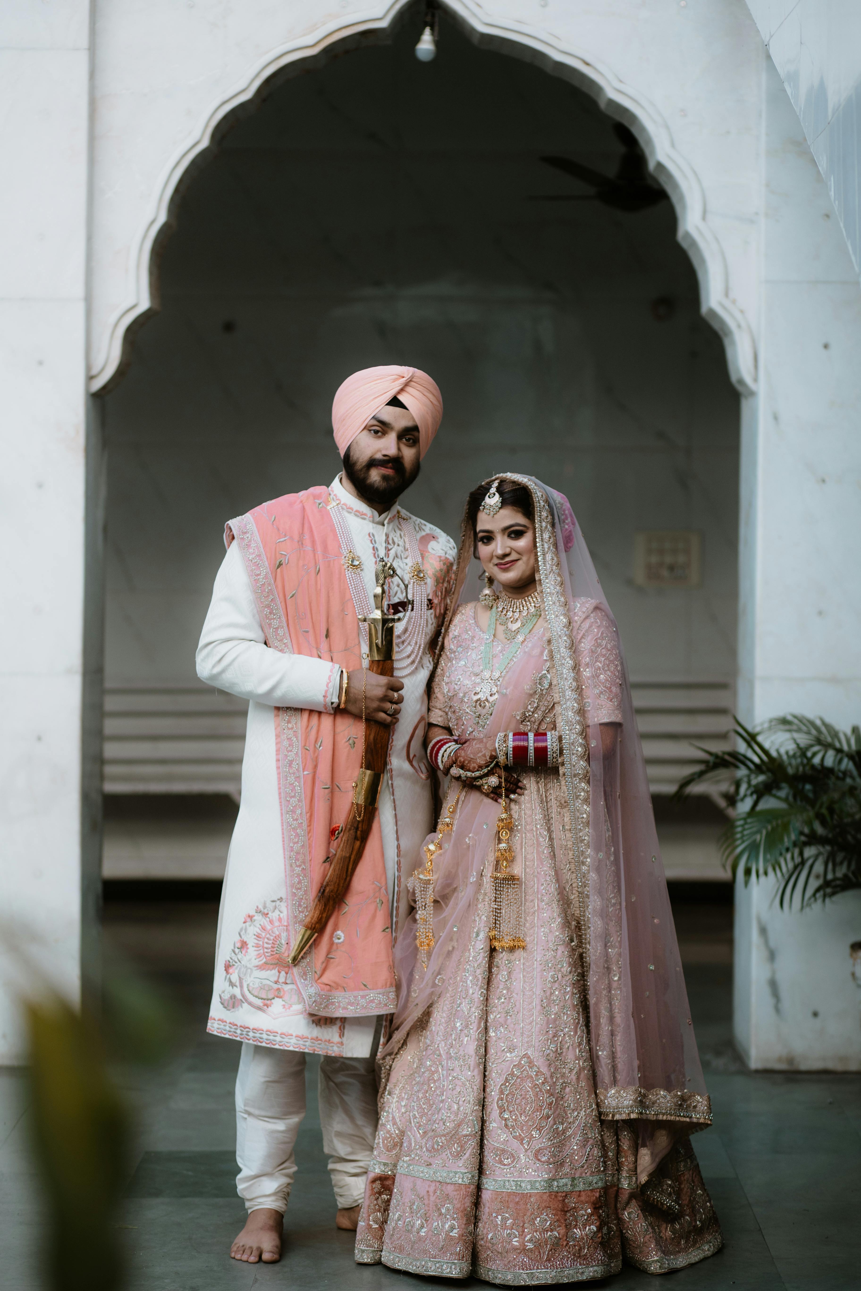 Traditional Sikh Wedding Couple in Elegant Attire · Free Stock Photo