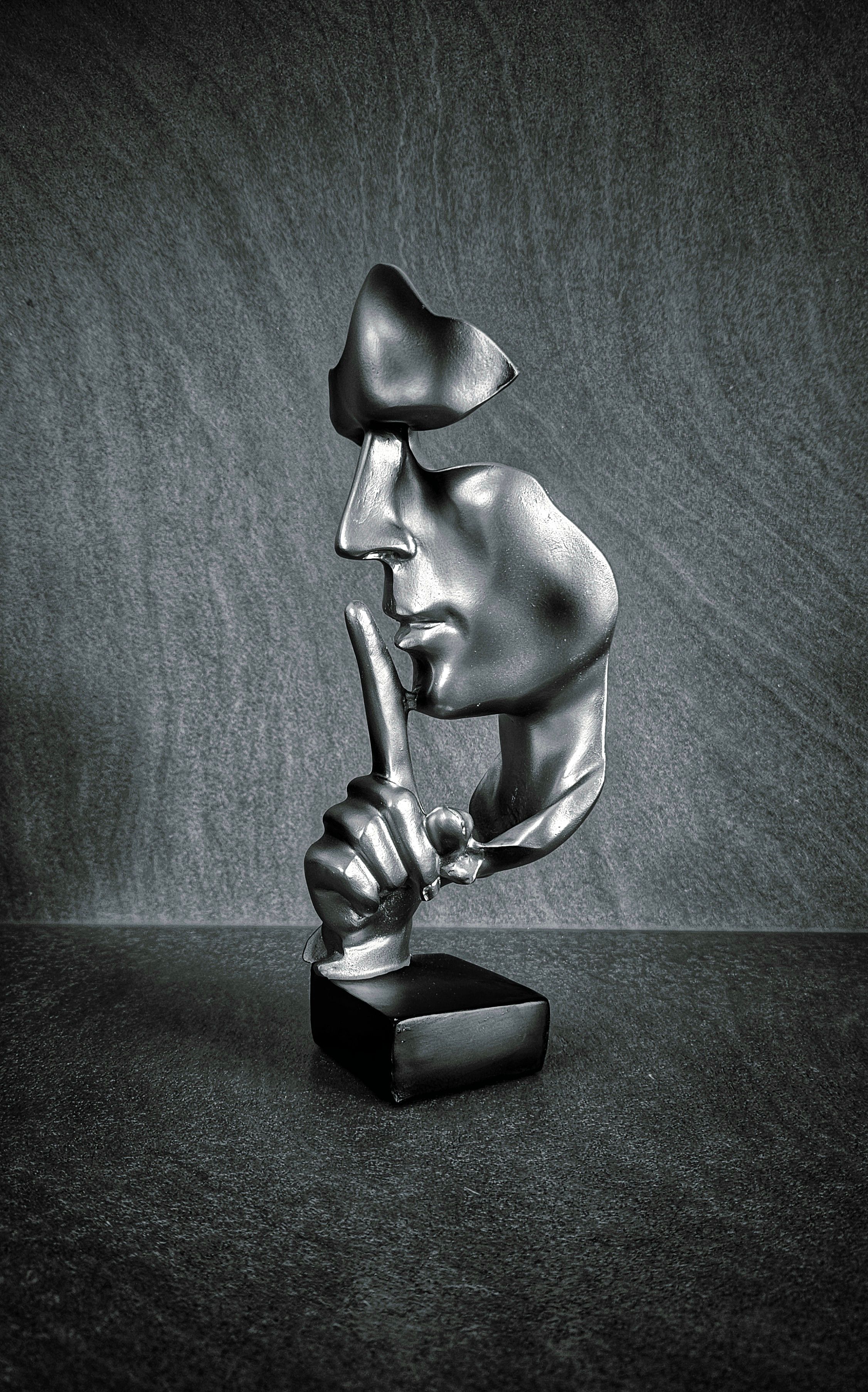 Modern Abstract Sculpture of a Silenced Face · Free Stock Photo