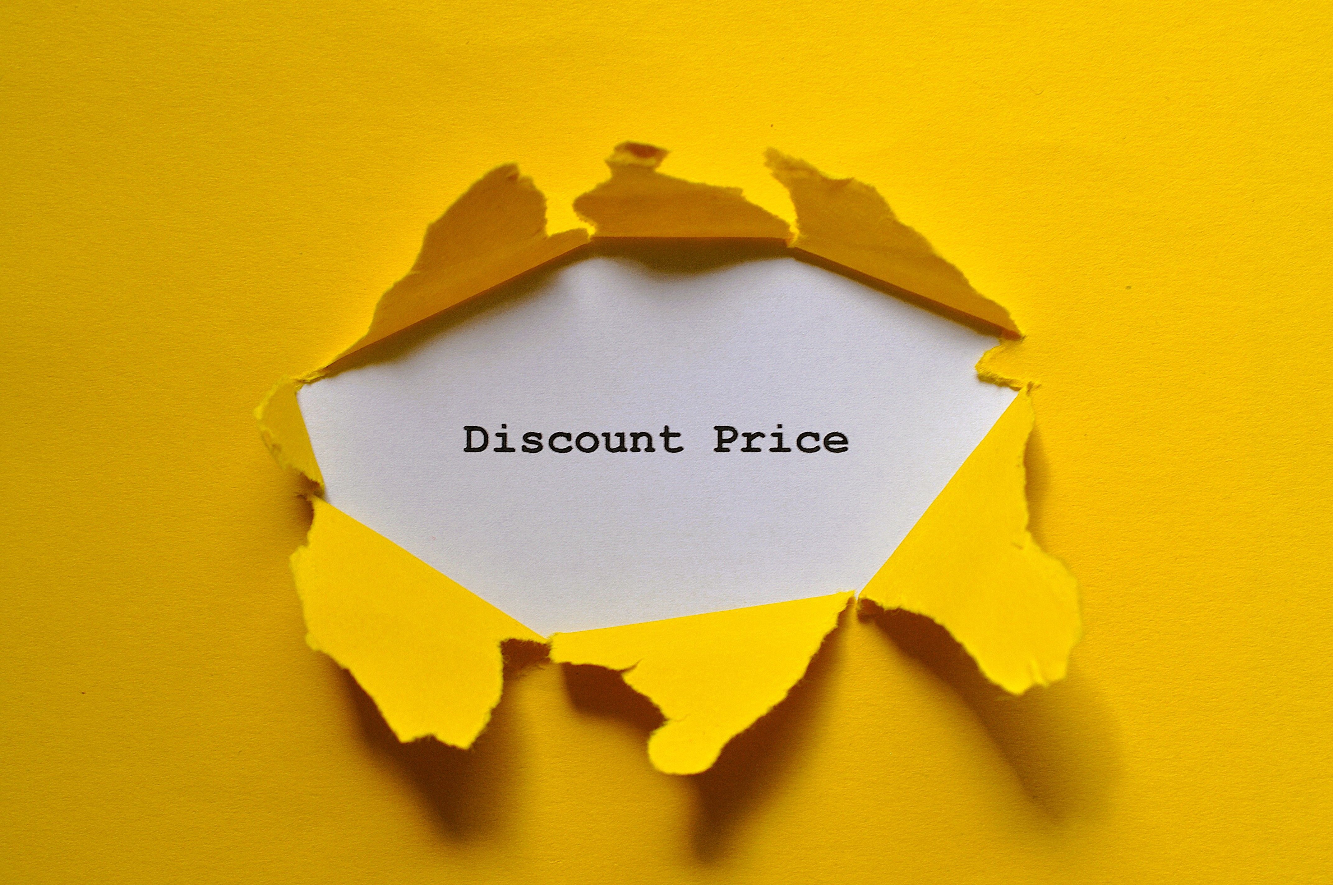 Yellow Torn Paper with Discount Price Text · Free Stock Photo