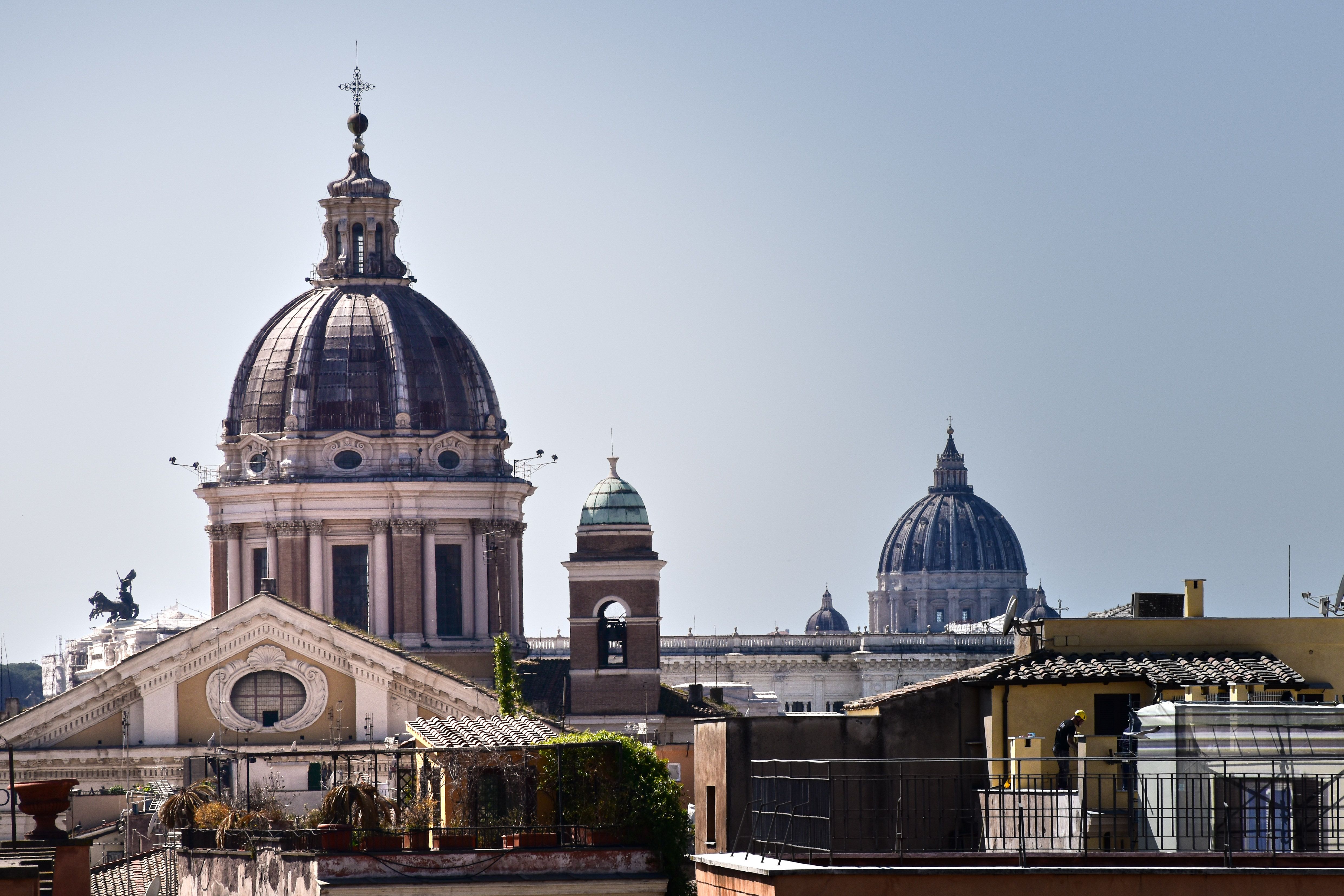 Iconic Rooftop View of Roman Architecture · Free Stock Photo