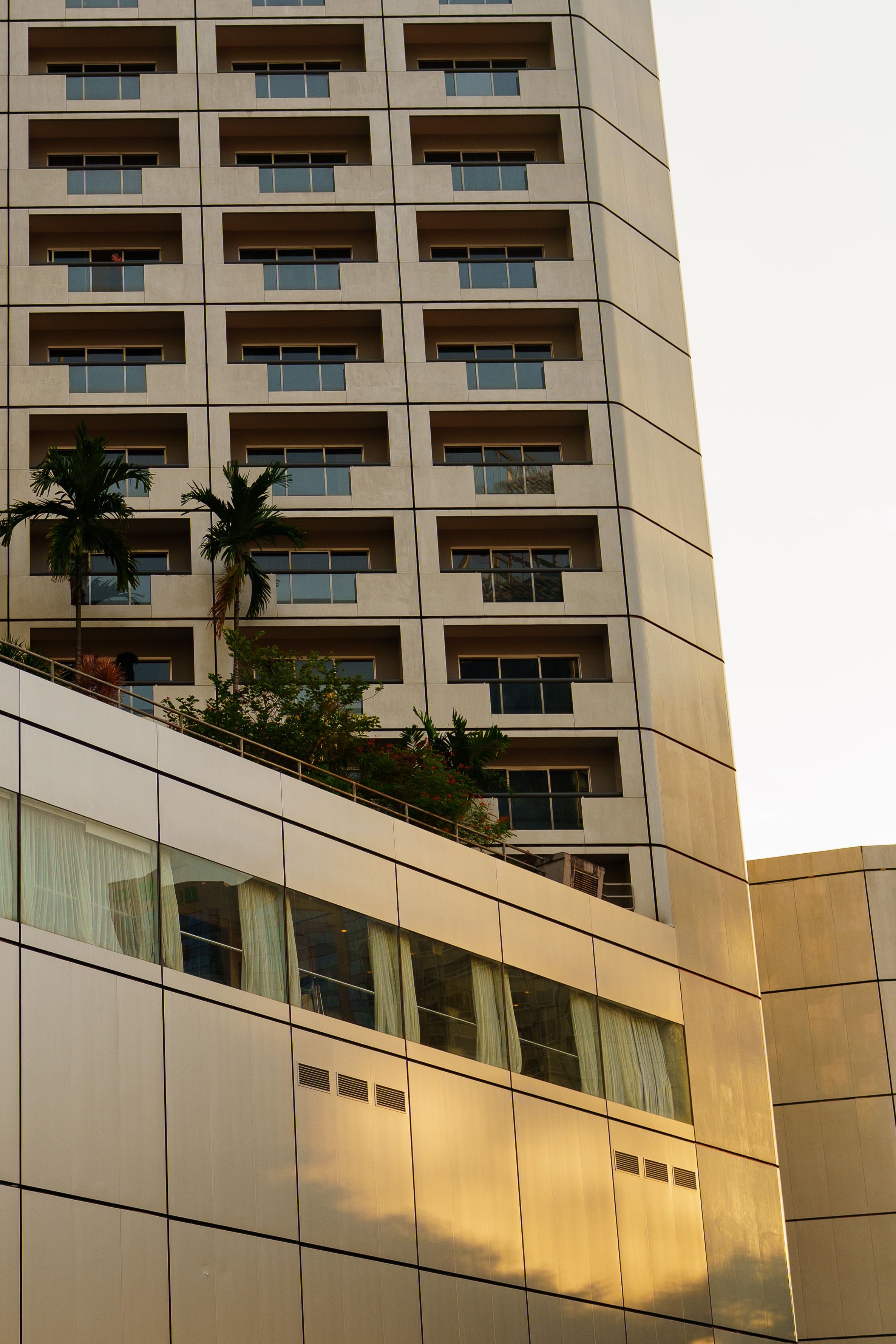 Modern High-Rise Building at Sunset · Free Stock Photo