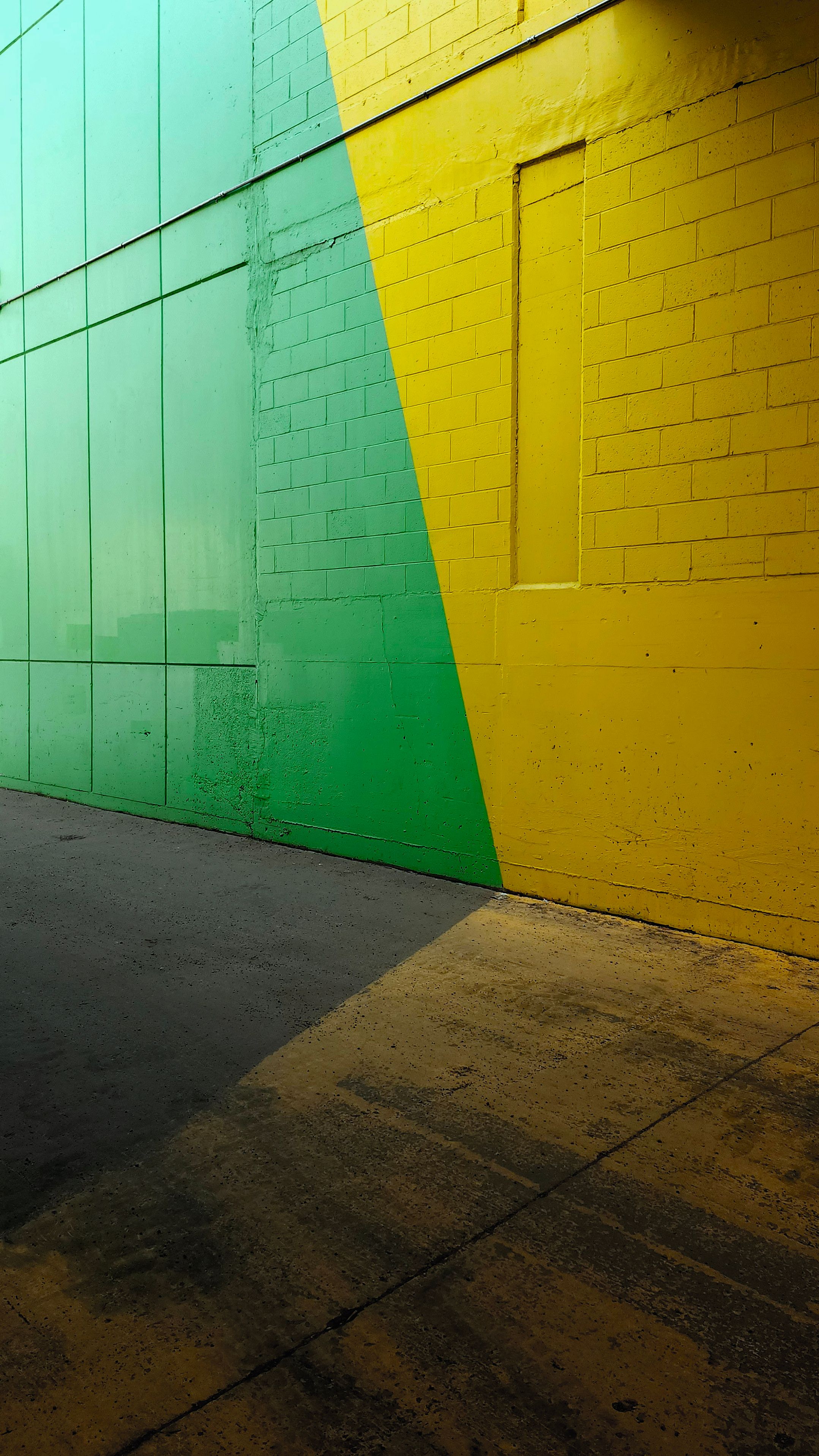 Vibrant Green and Yellow Urban Alleyway in Edmonton · Free Stock Photo
