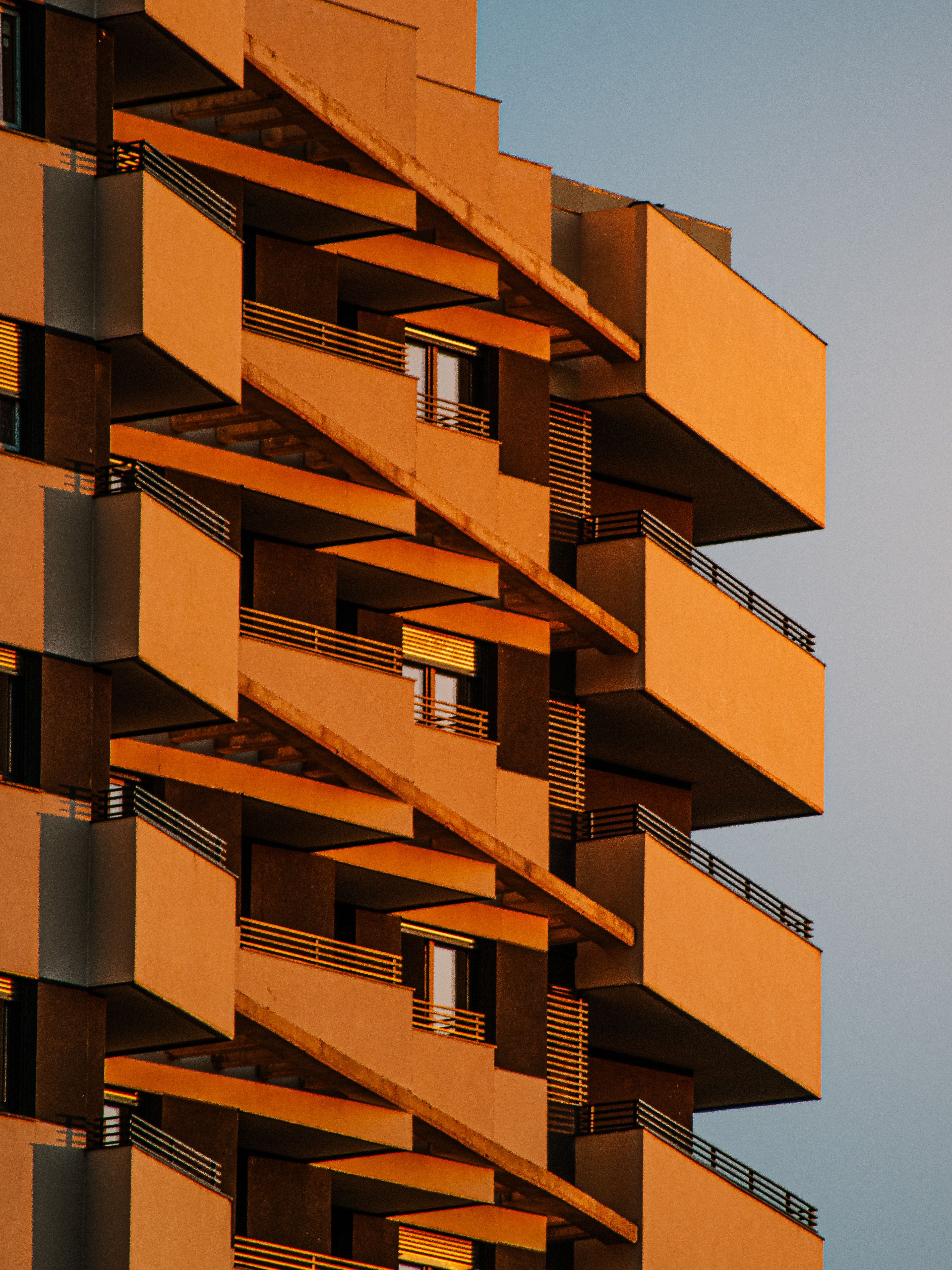 Modern Geometric Apartment Building at Sunset · Free Stock Photo