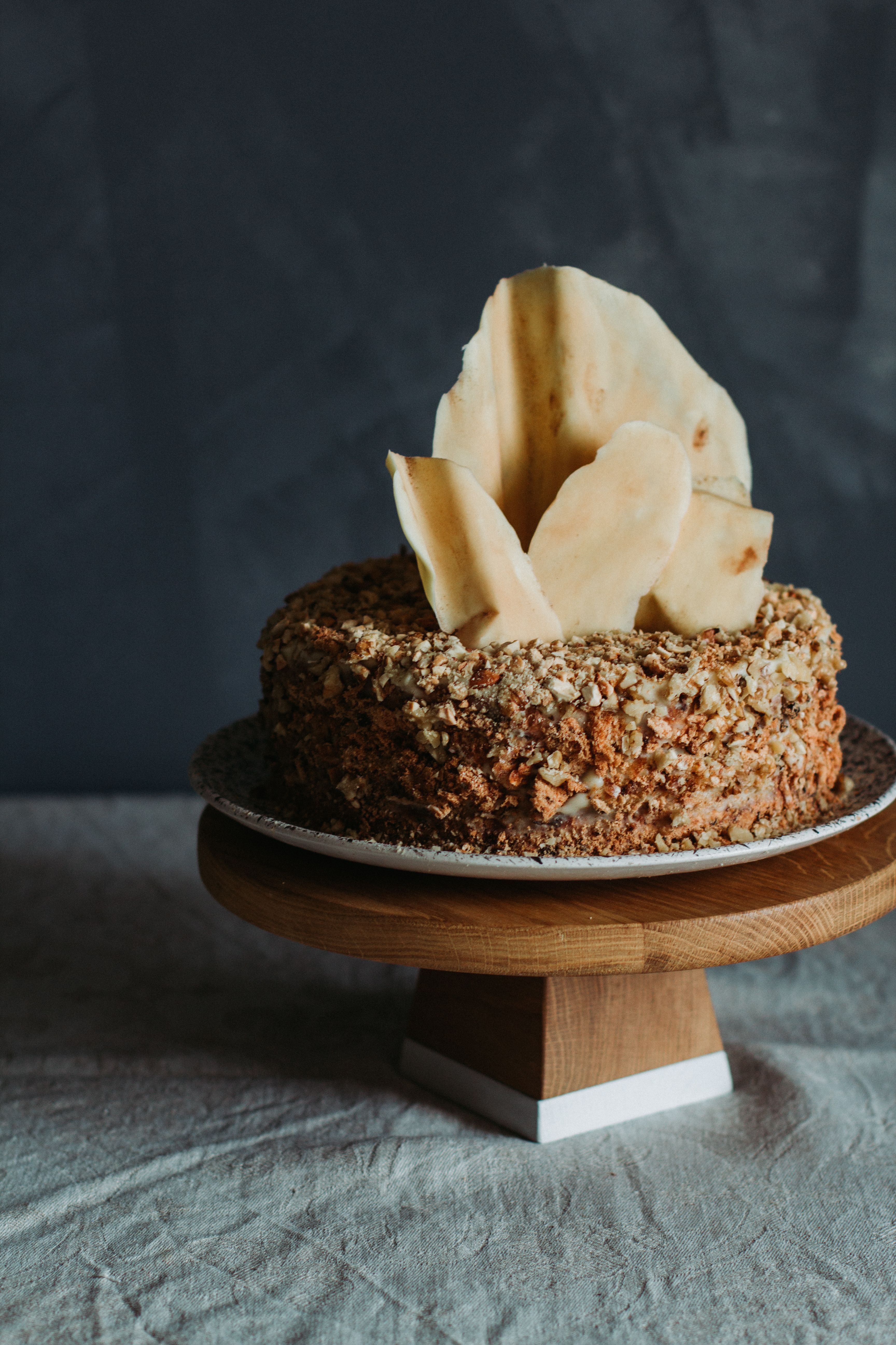 A Round Brown and White Cake On Top Of A Table · Free Stock Photo