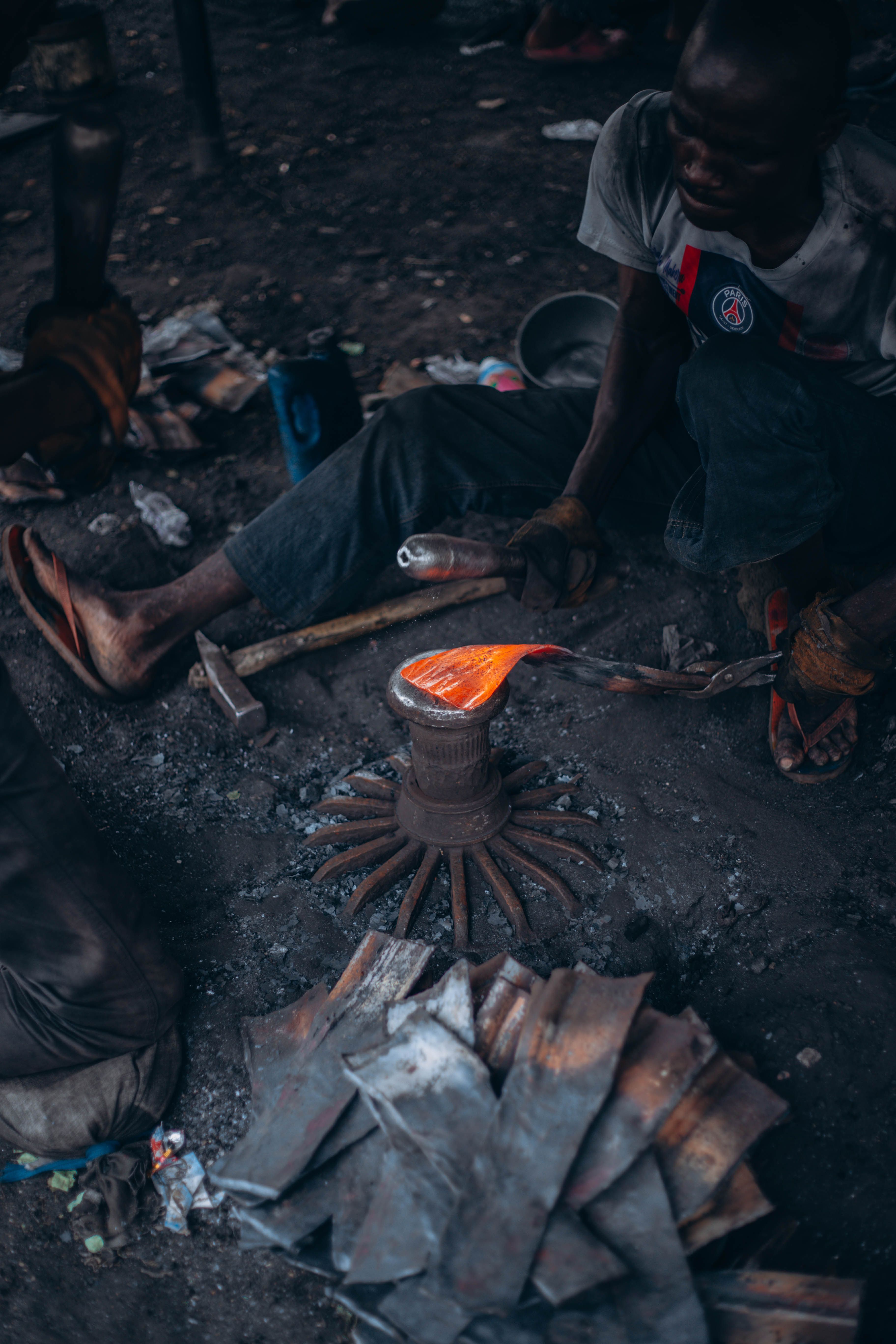 Hardworking Blacksmith Forging Metal by Fire · Free Stock Photo