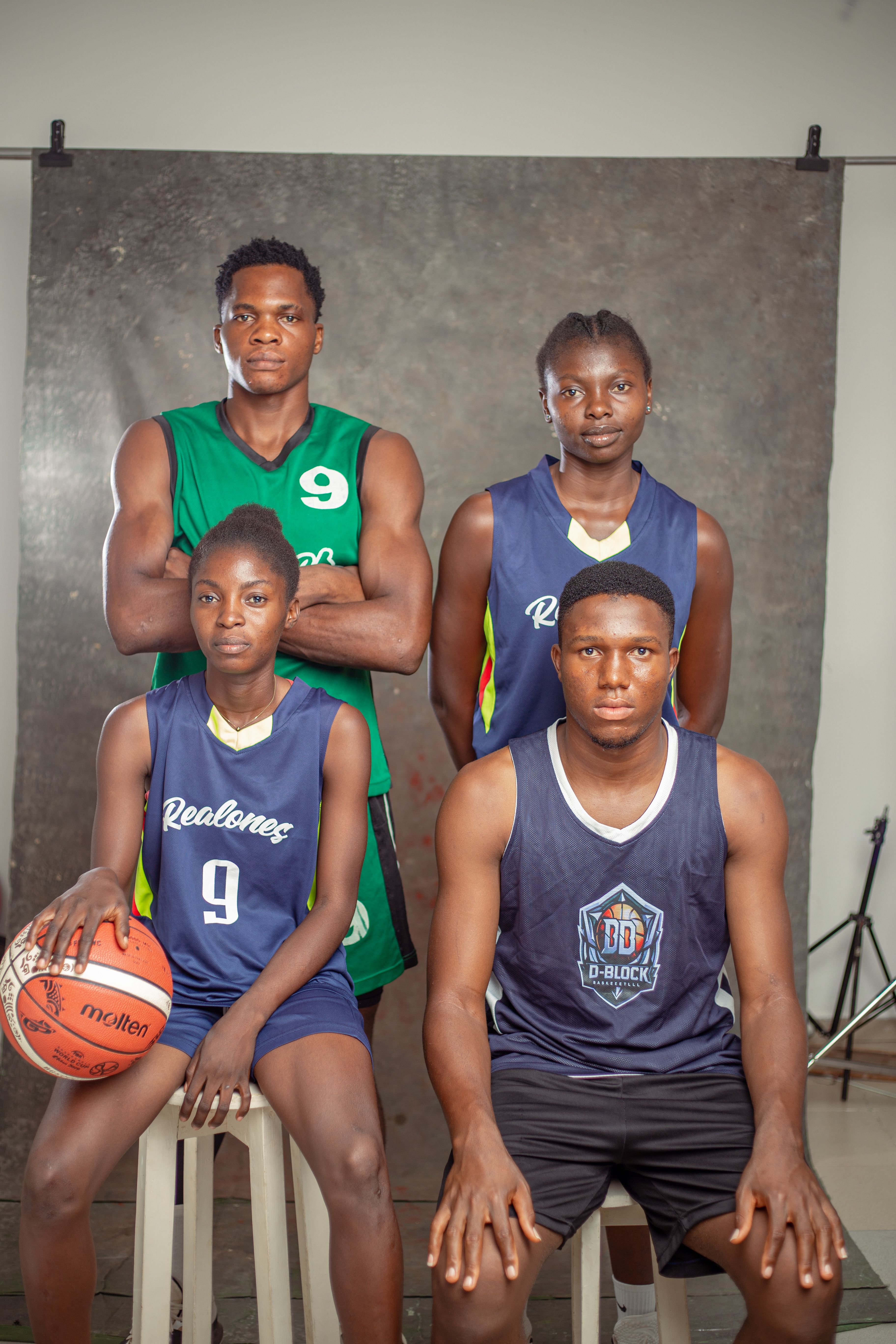 Young Basketball Team Portrait in Uniforms · Free Stock Photo