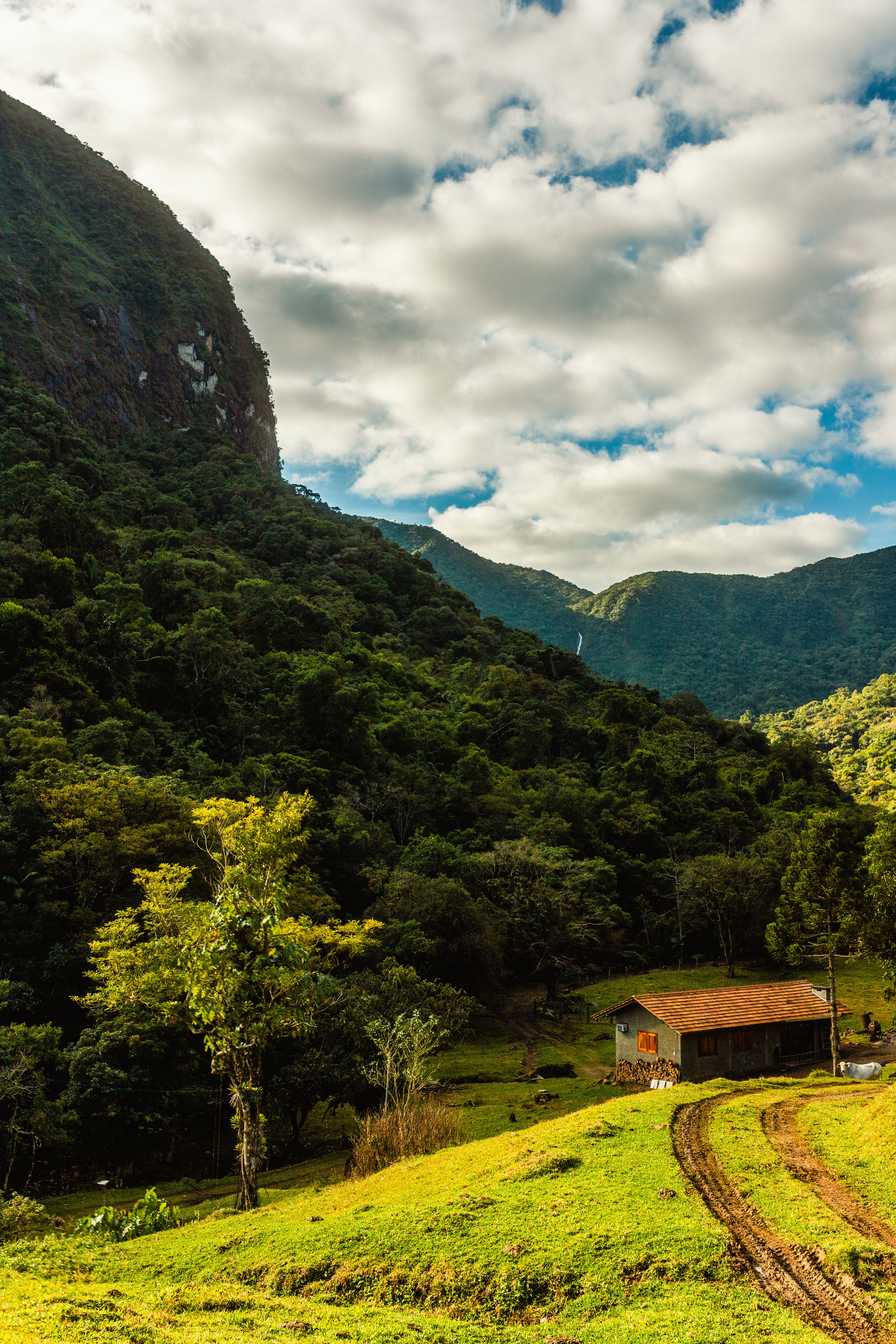 Scenic Mountain Landscape with Rustic Cabin · Free Stock Photo