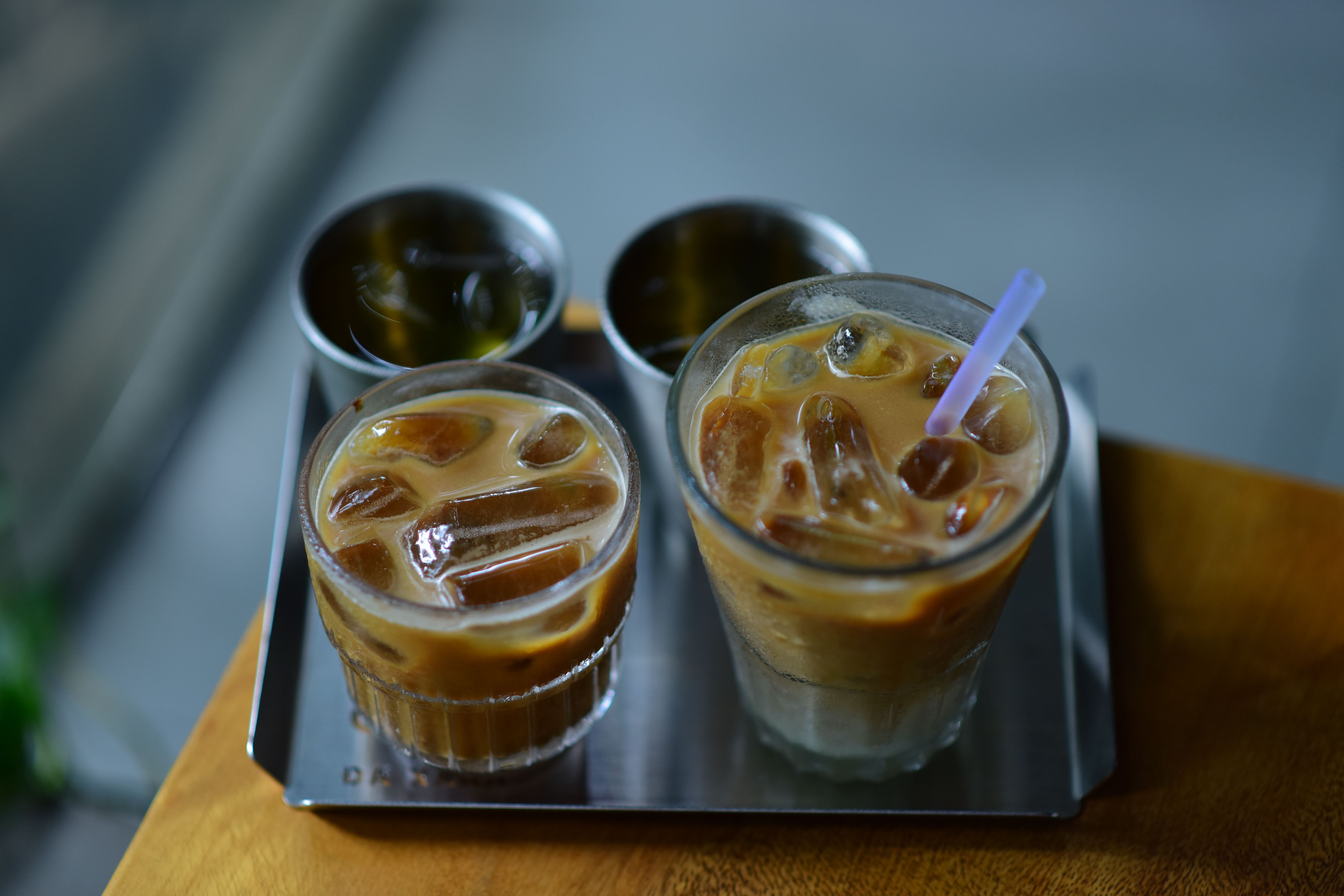 Close-up of Refreshing Iced Coffee on Tray · Free Stock Photo