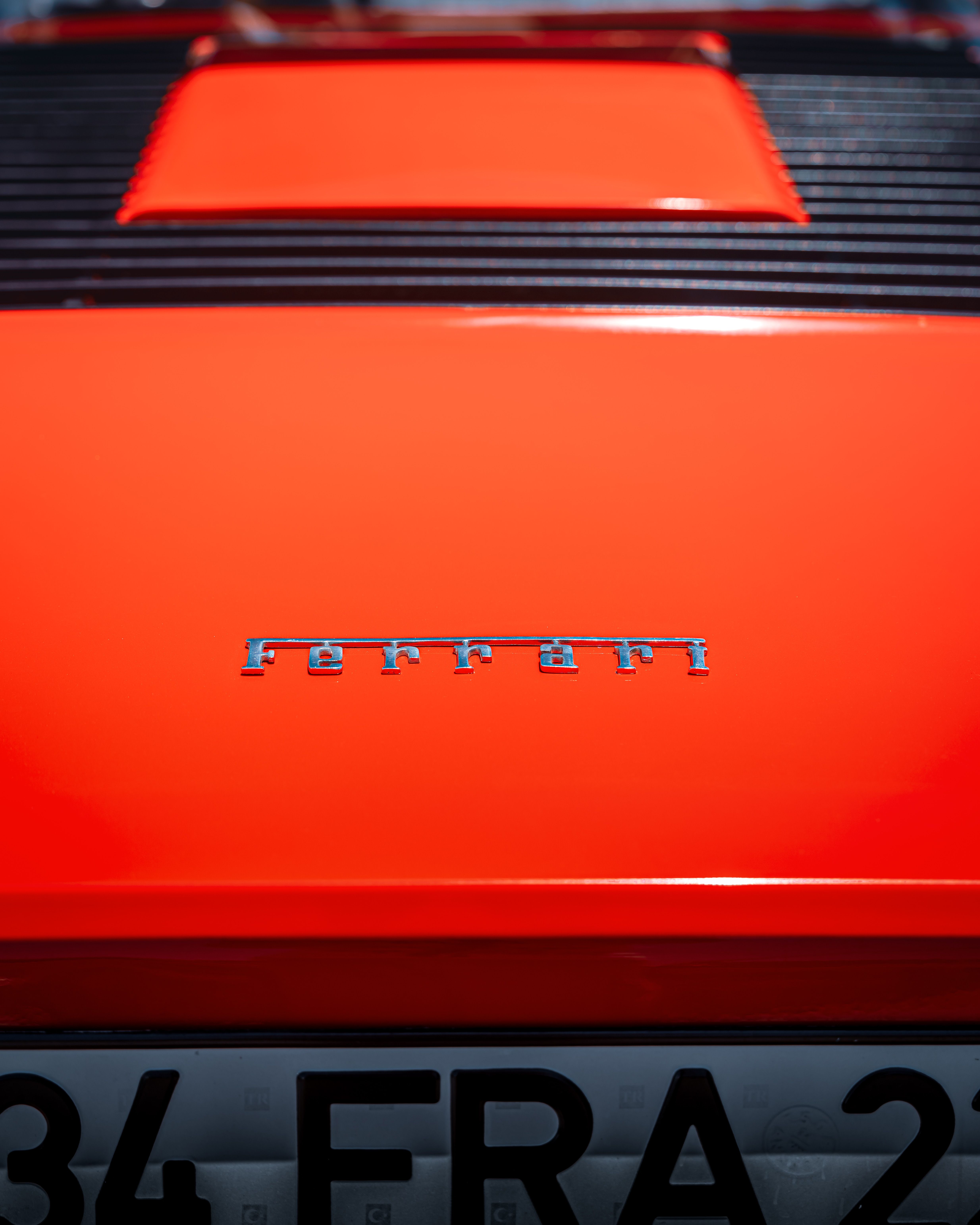 Close-up of Ferrari Rear in Bright Red · Free Stock Photo