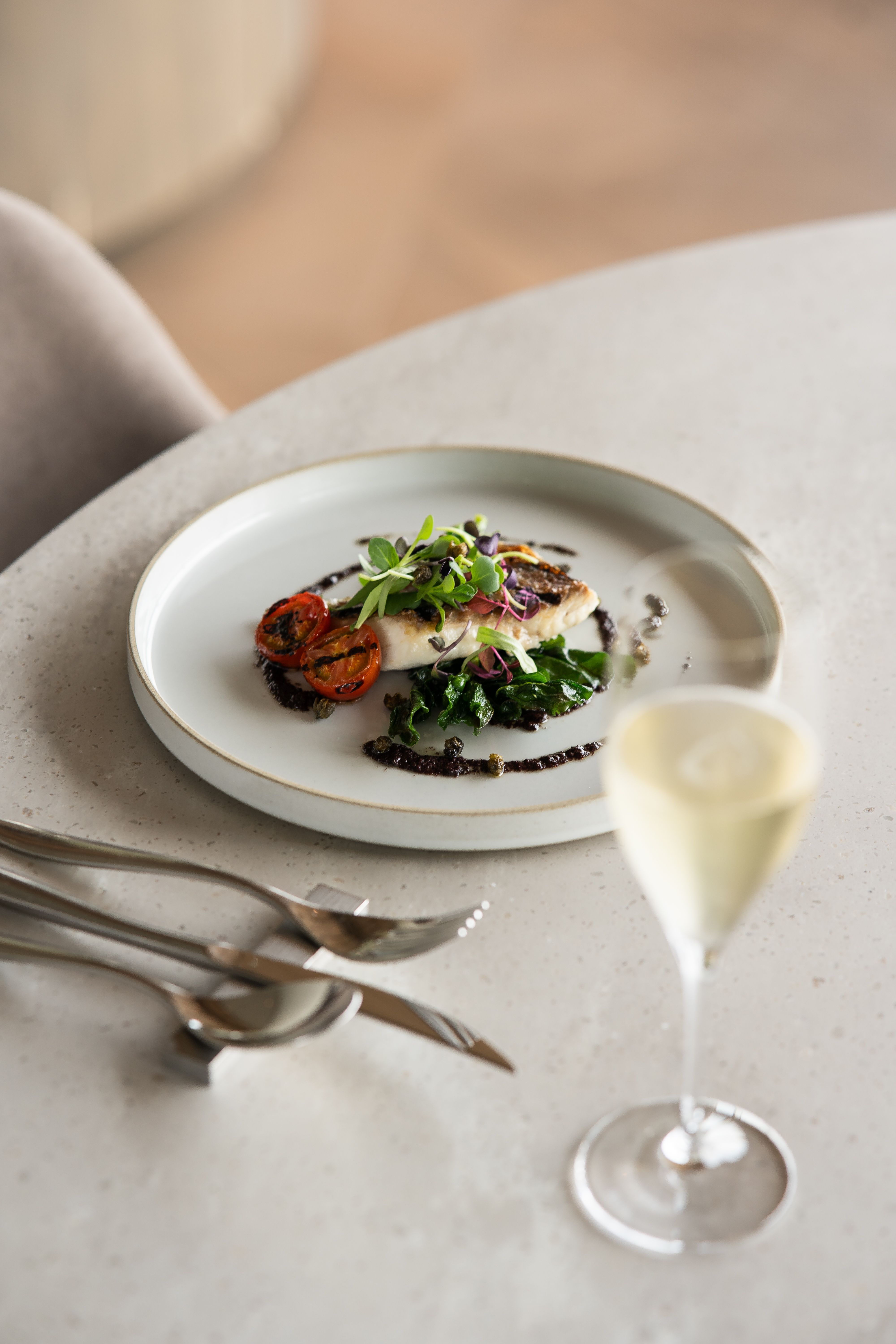 Elegant Fish Dish with Champagne in Tokyo Restaurant · Free Stock Photo