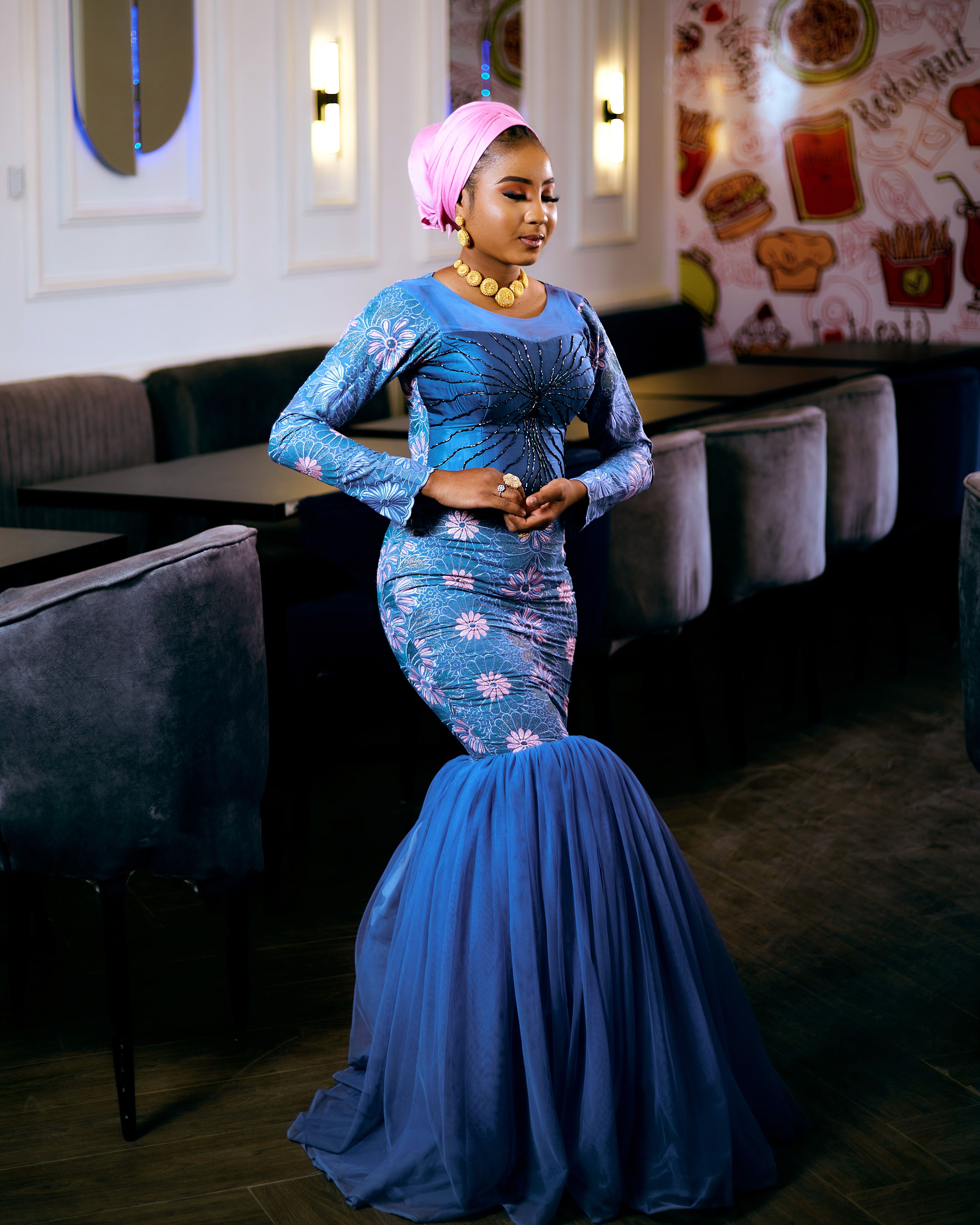 Elegant Woman in Traditional Blue Dress Indoors · Free Stock Photo