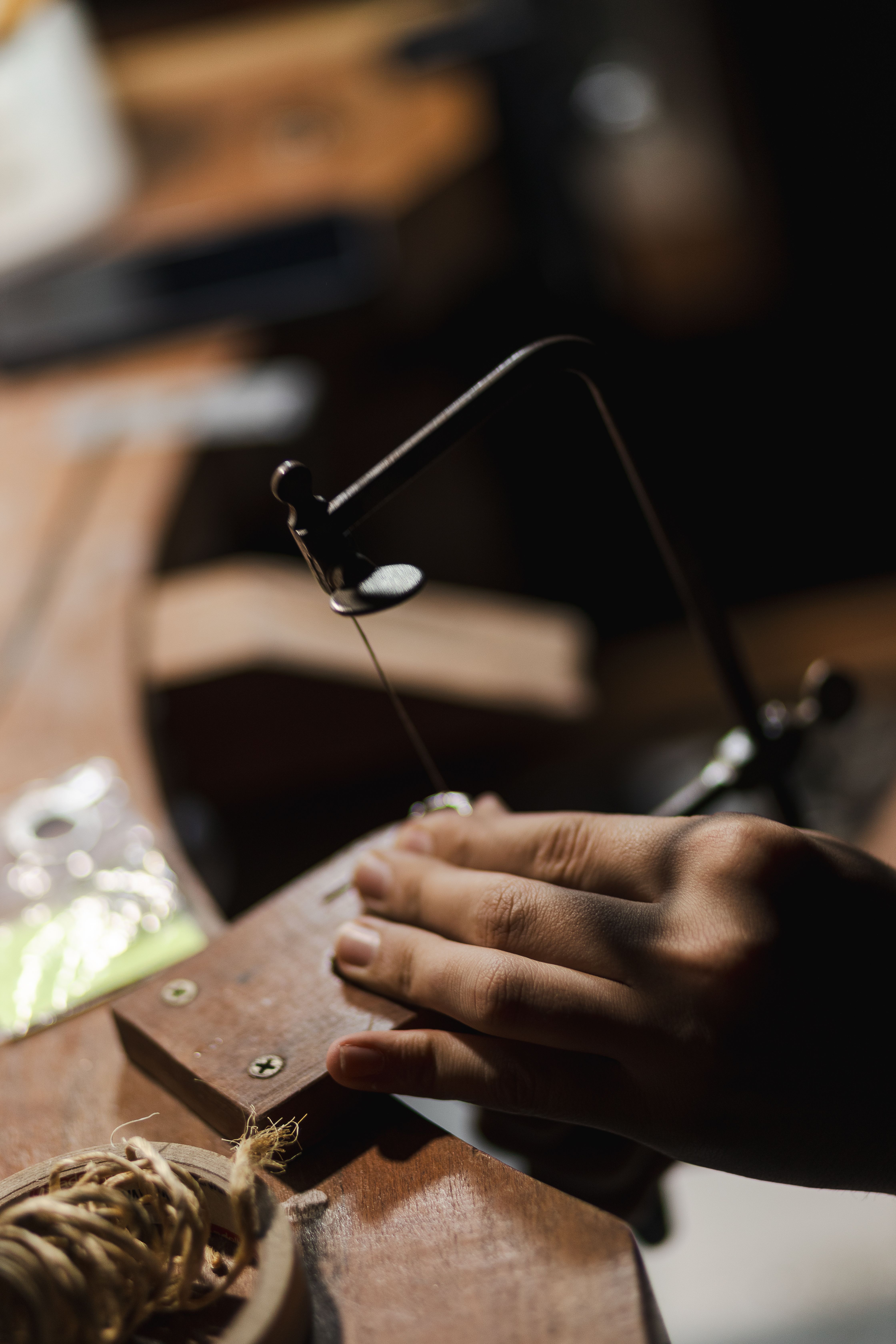 Artisan at Work Crafting Jewelry with Precision · Free Stock Photo