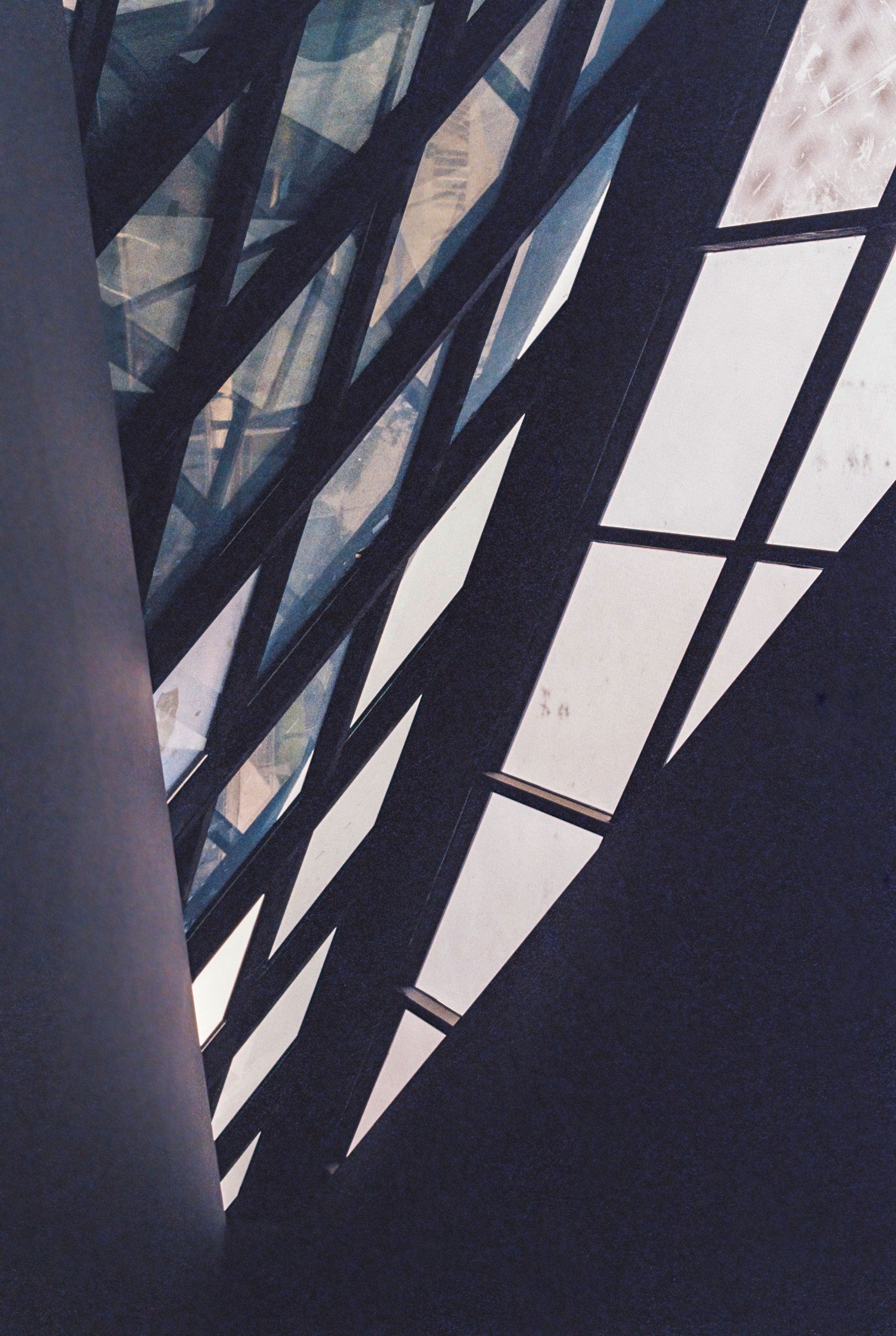 Abstract View of Modern Geometric Glass Architecture · Free Stock Photo