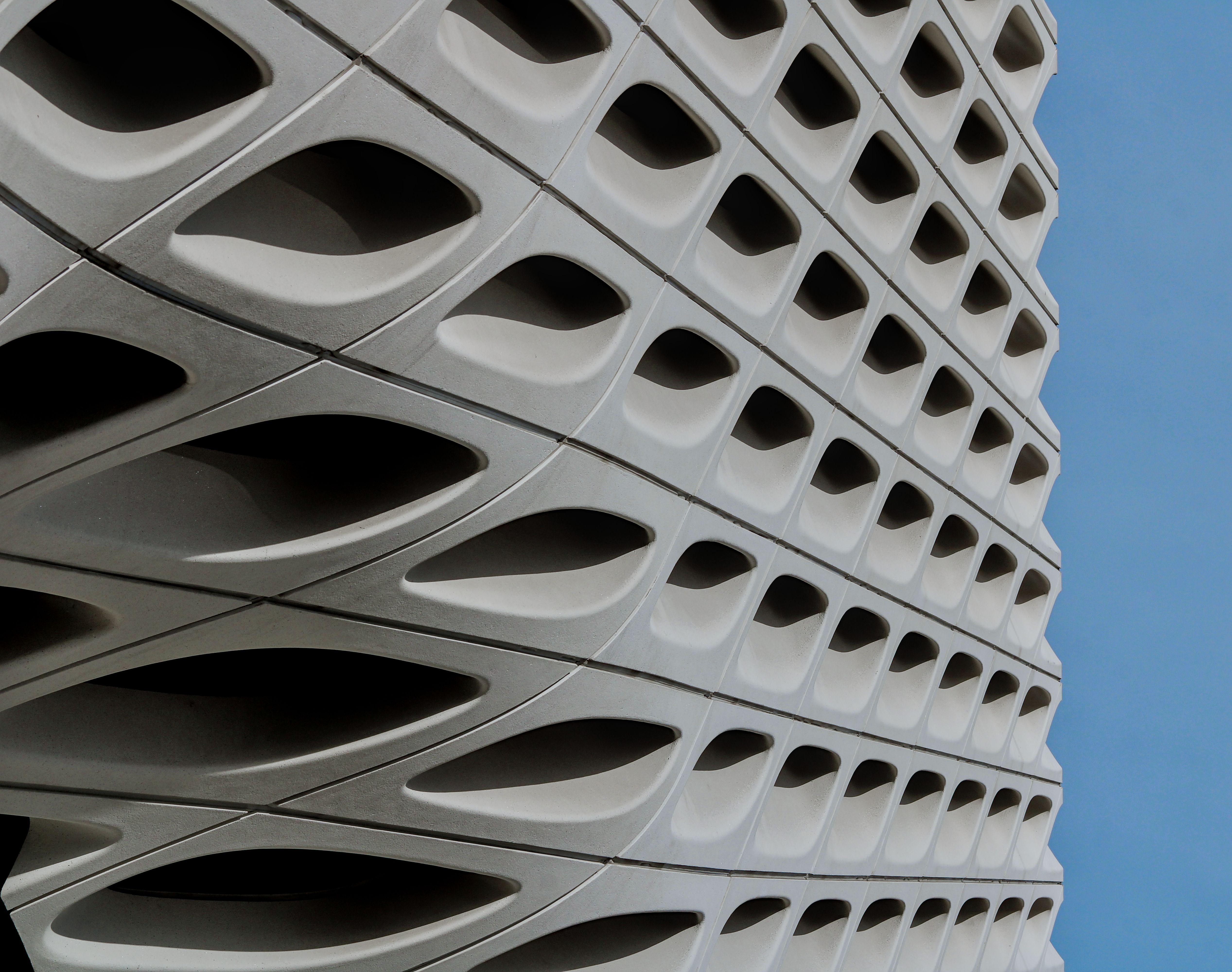 Modern Architectural Façade with Geometric Design · Free Stock Photo