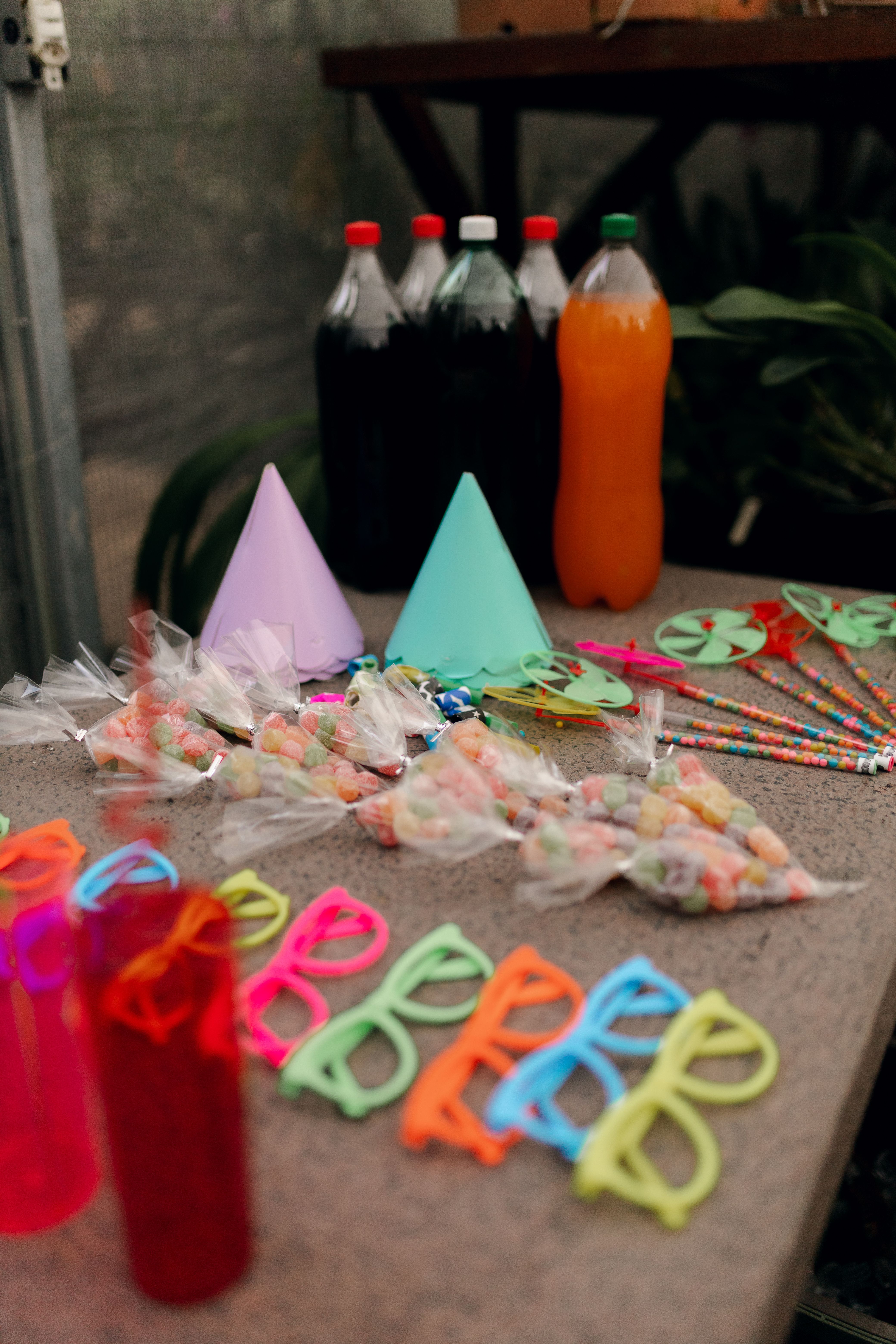 Festive Party Items: Glasses, Hats, and Drinks · Free Stock Photo