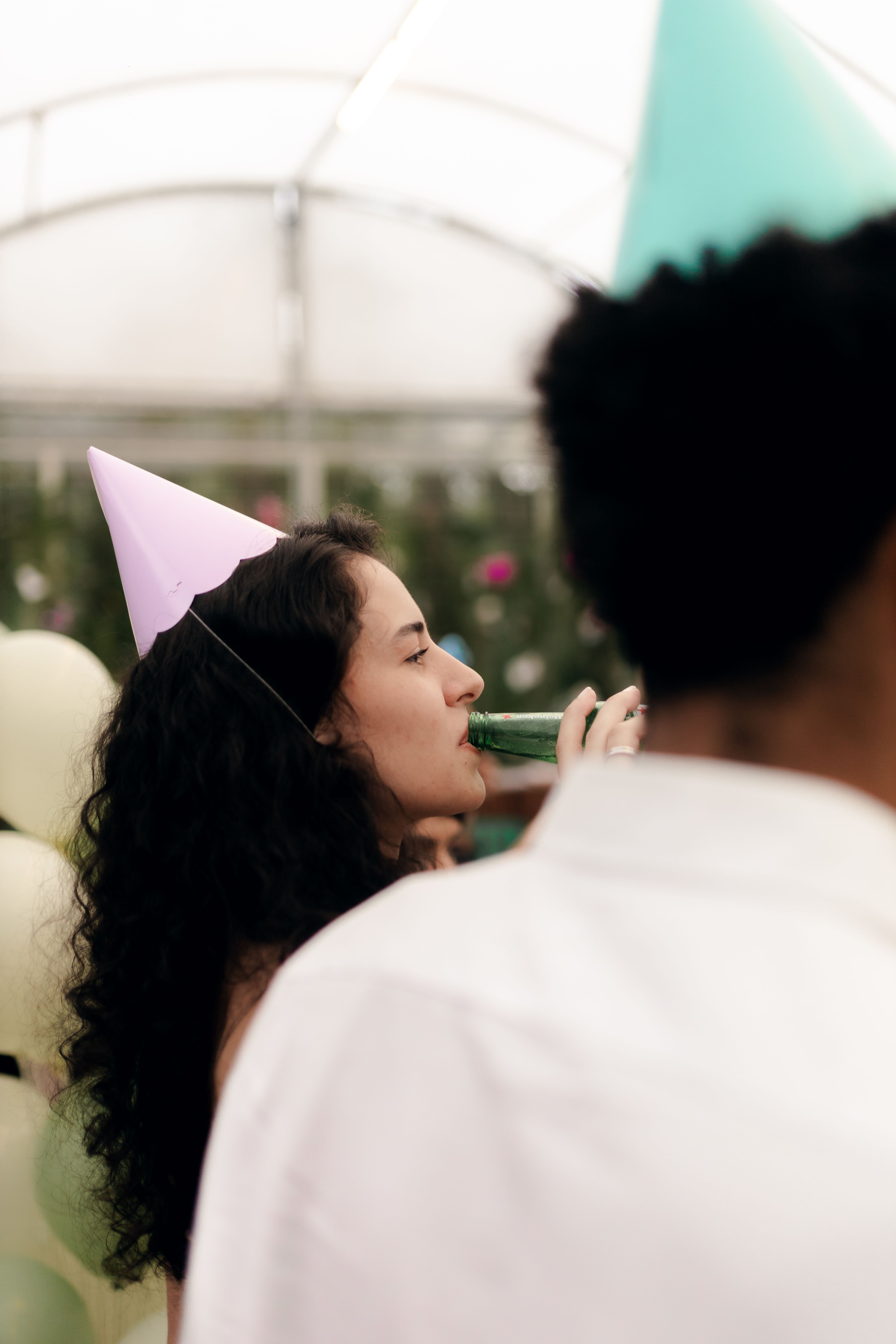Celebratory Party Scene with Colorful Hats · Free Stock Photo