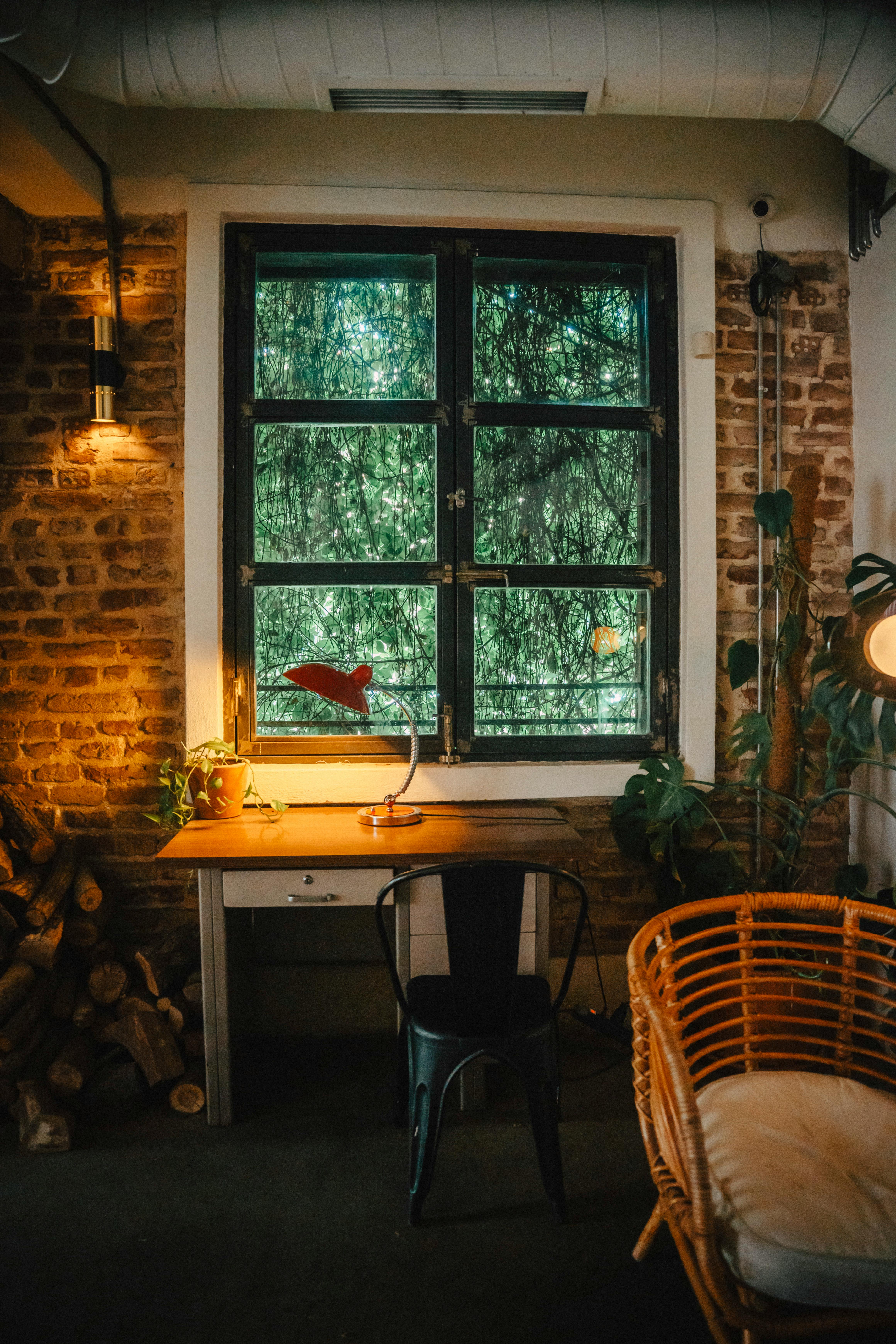Cozy Indoor Workspace with Autumn View · Free Stock Photo