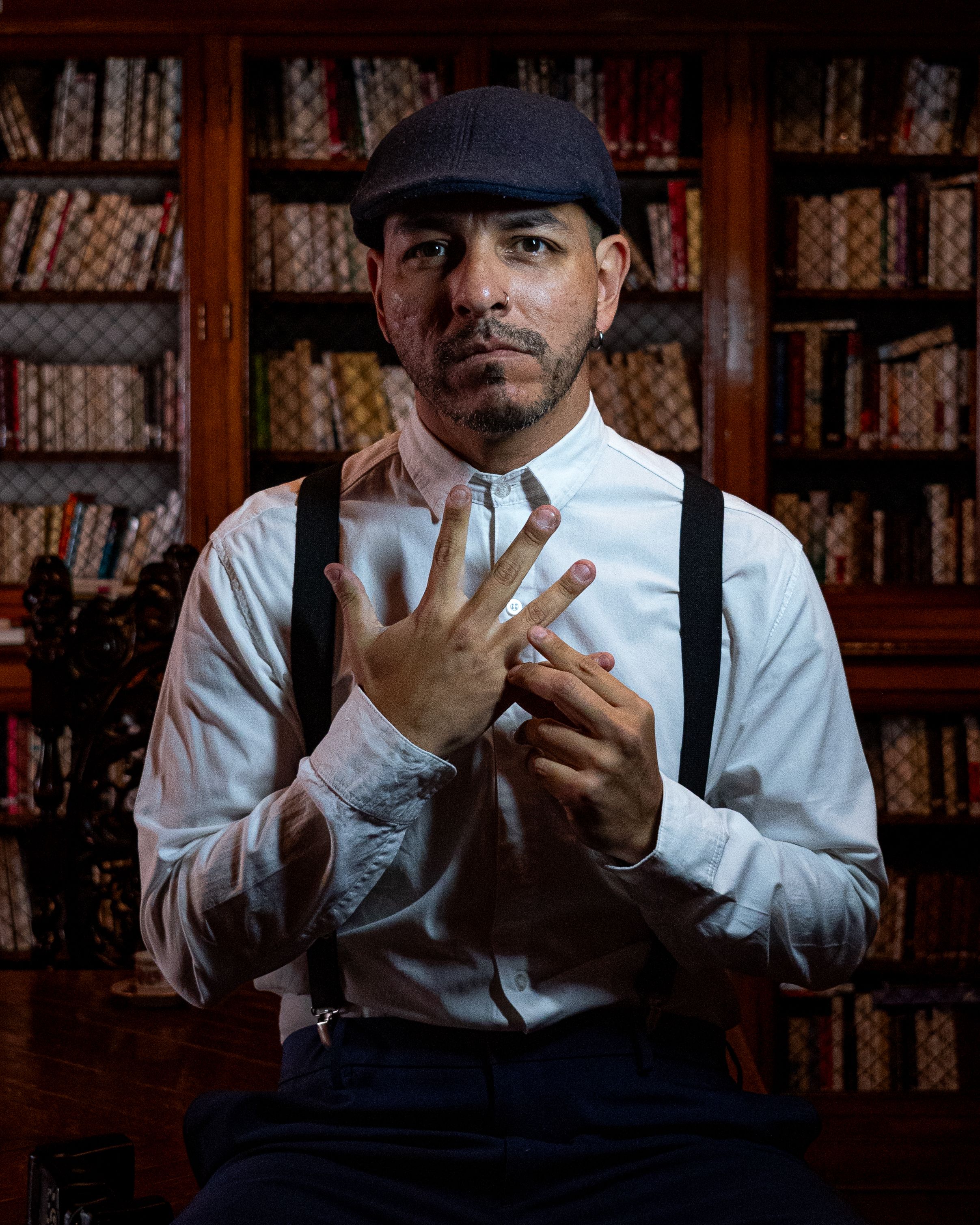 Portrait of Man in Vintage Library Setting · Free Stock Photo