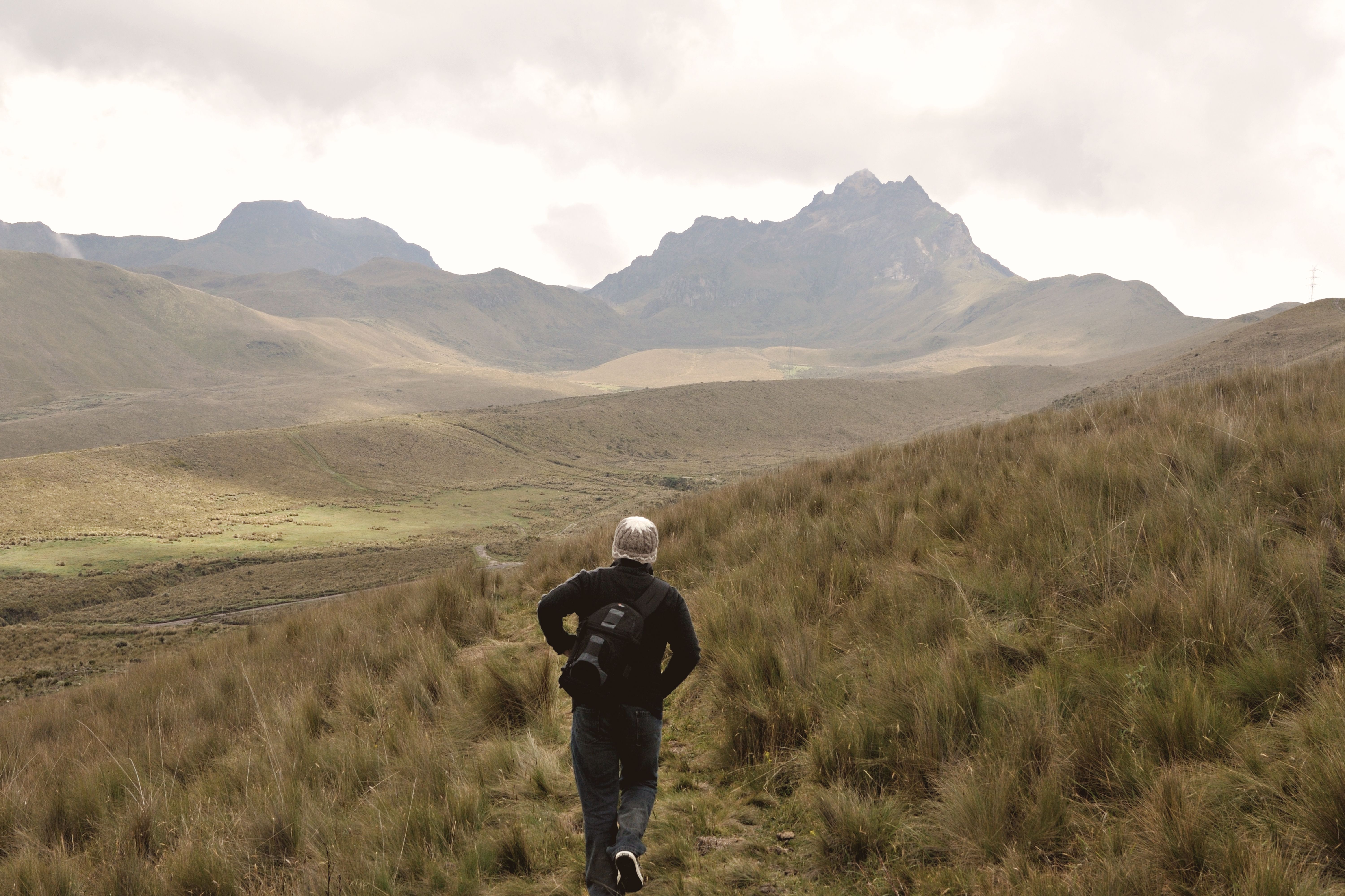 Hiker exploring the Andes Mountains in Ecuador · Free Stock Photo
