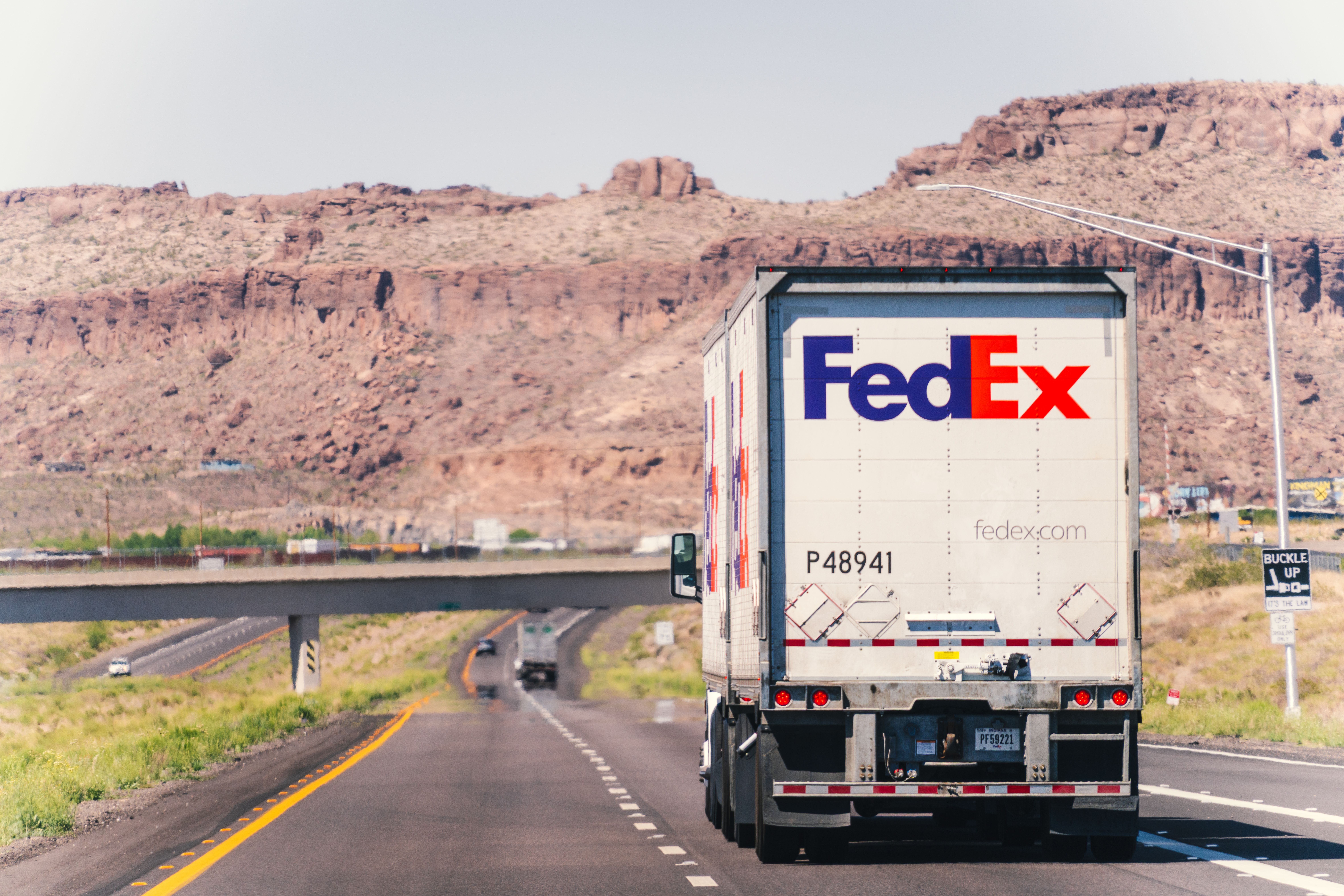 FedEx Truck on Scenic Arizona Highway · Free Stock Photo