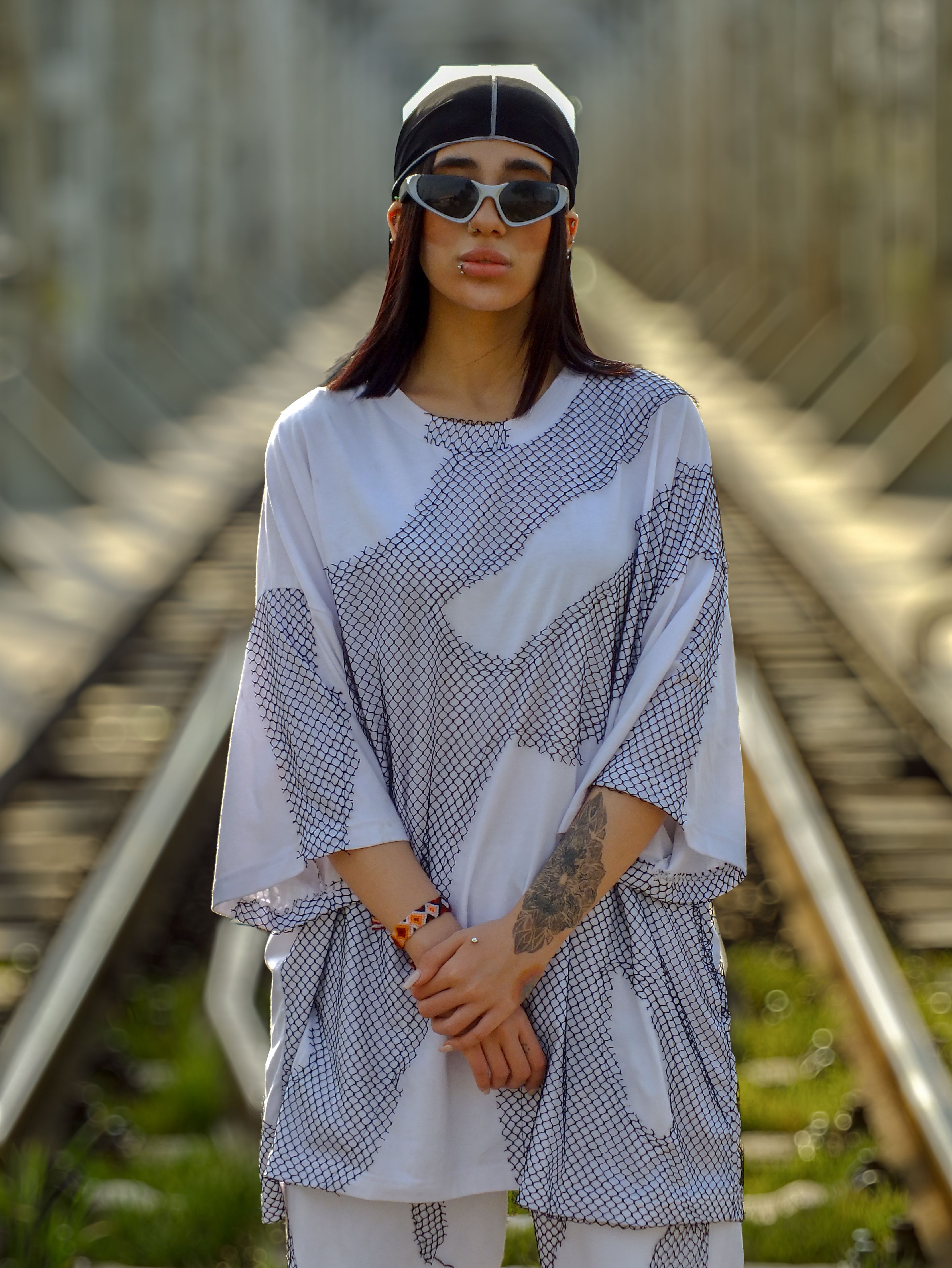Fashionable Woman on Train Tracks with Street Style · Free Stock Photo