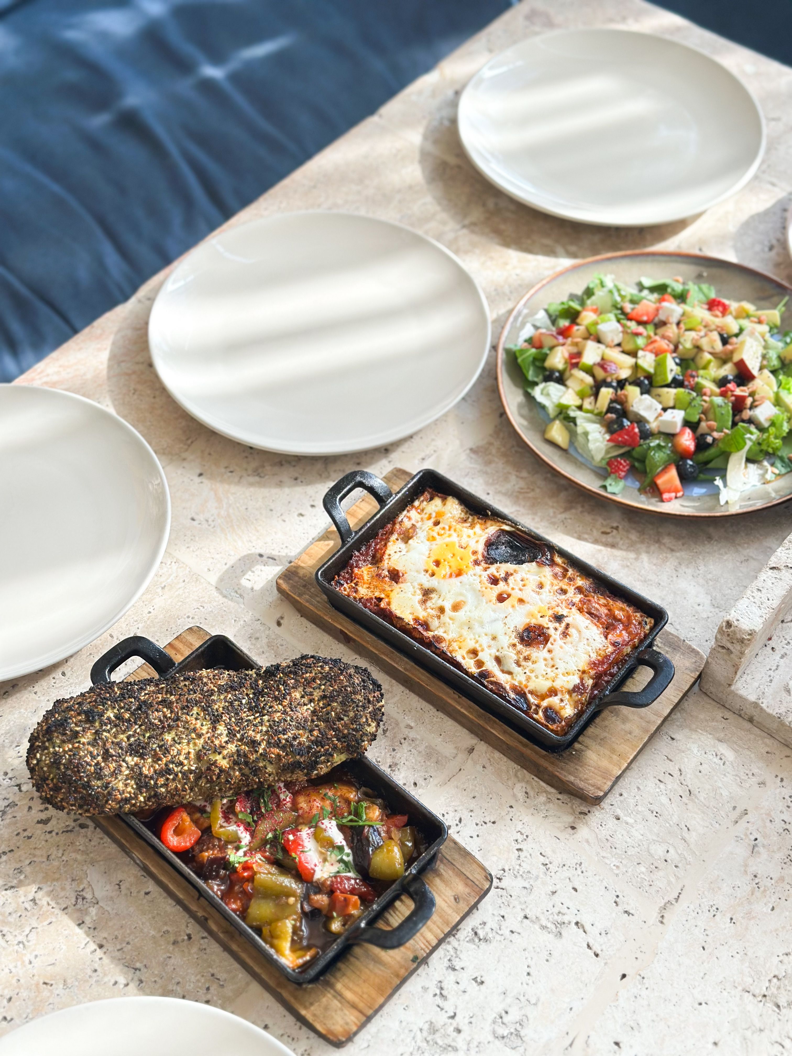 Rustic Table Setting with Mediterranean Dishes · Free Stock Photo