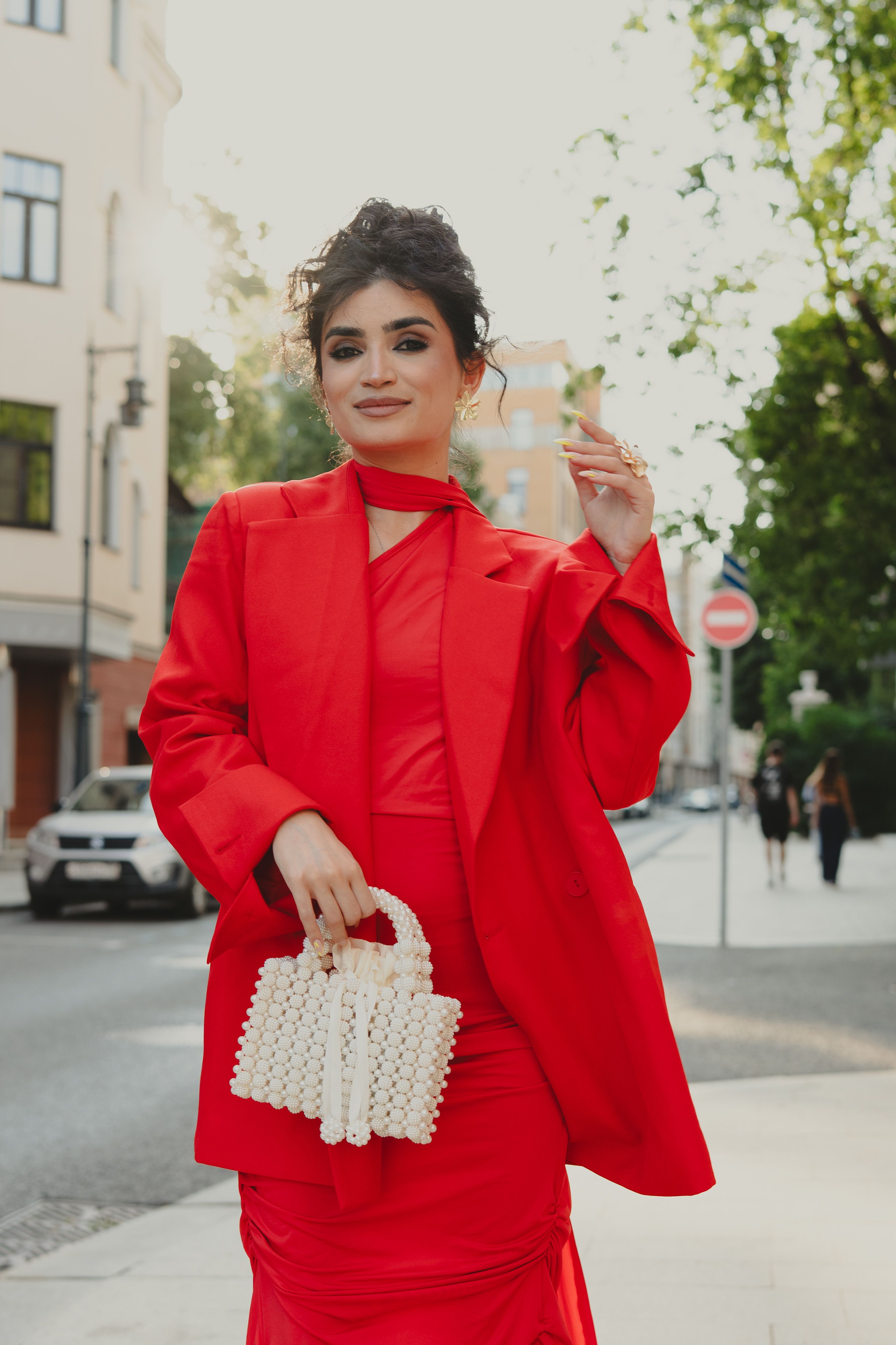 Elegant Woman in Red Dress on City Street · Free Stock Photo