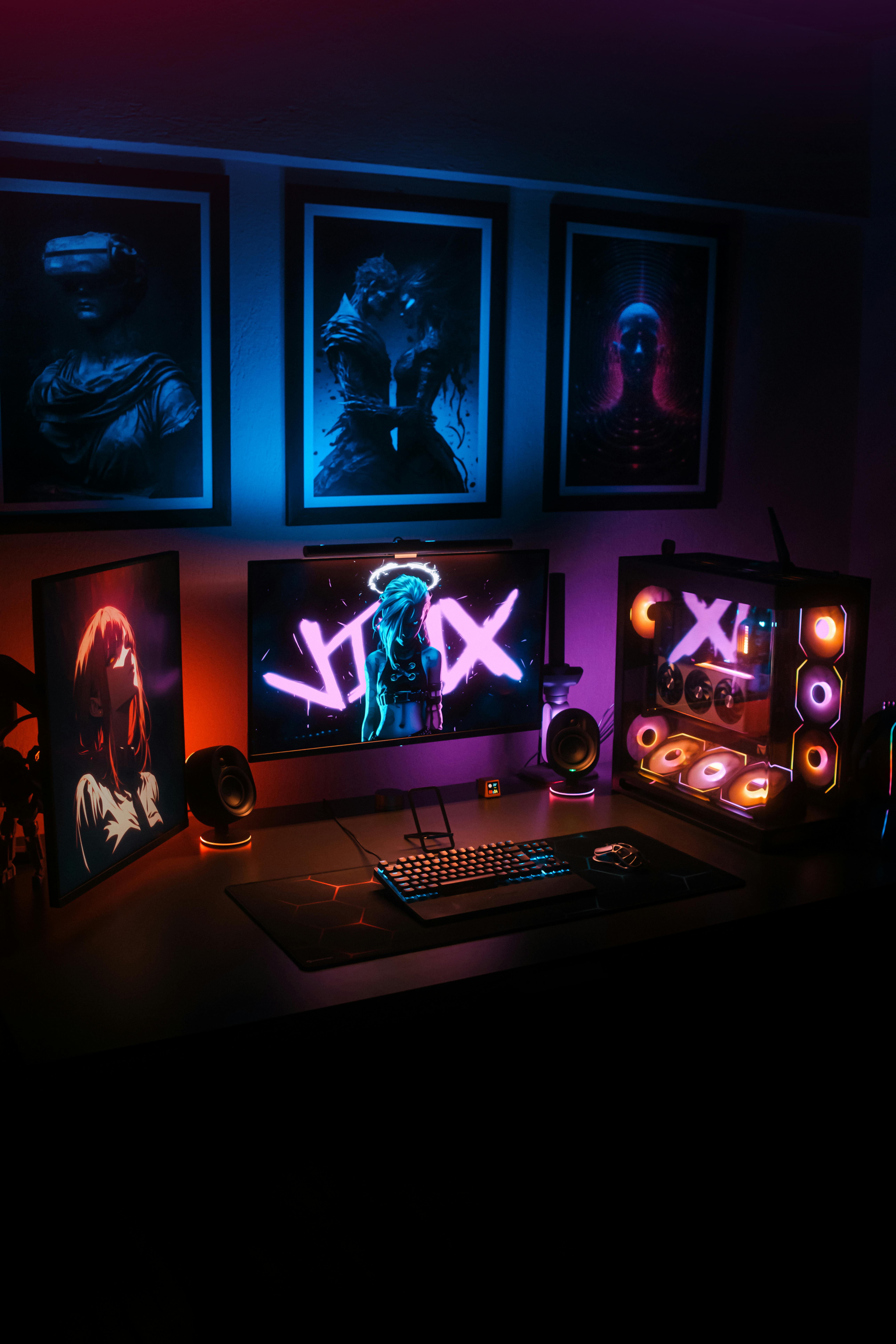 Colorful Gaming Setup with Neon Lights and Art · Free Stock Photo