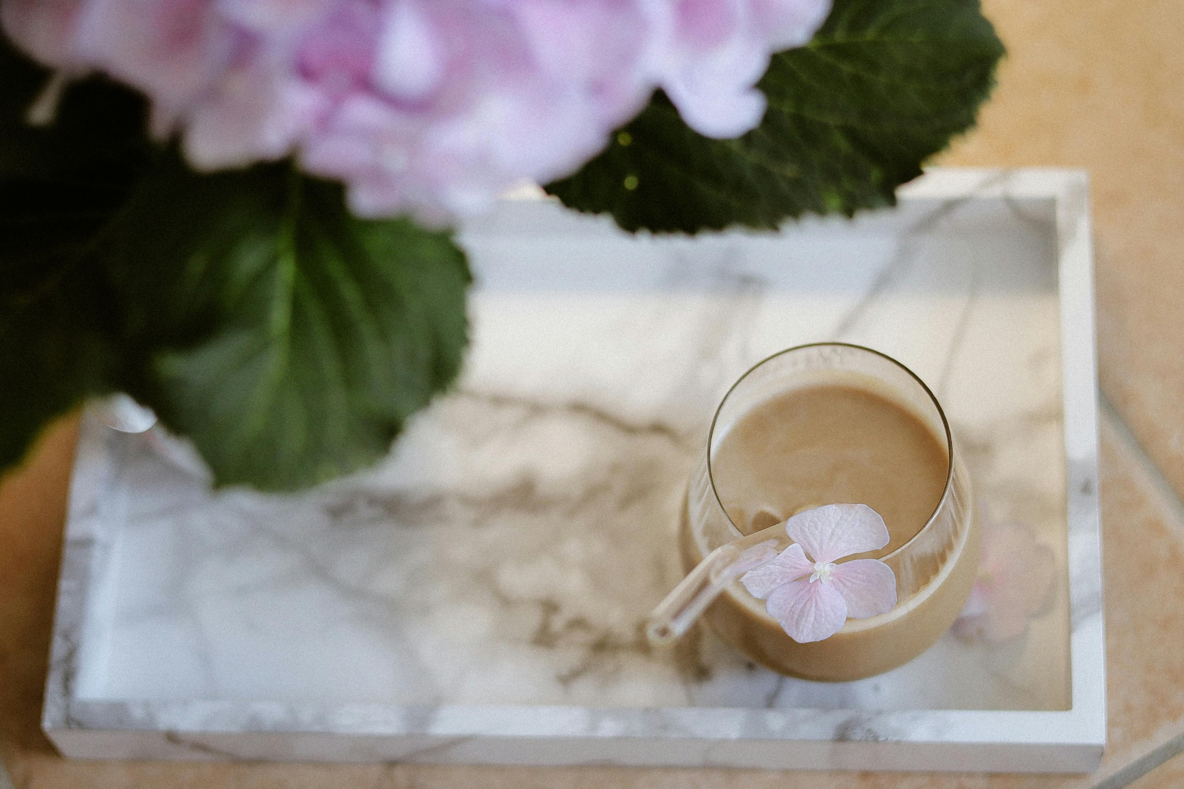 Elegant Floral Coffee on Marble Tray with Hydrangeas · Free Stock Photo