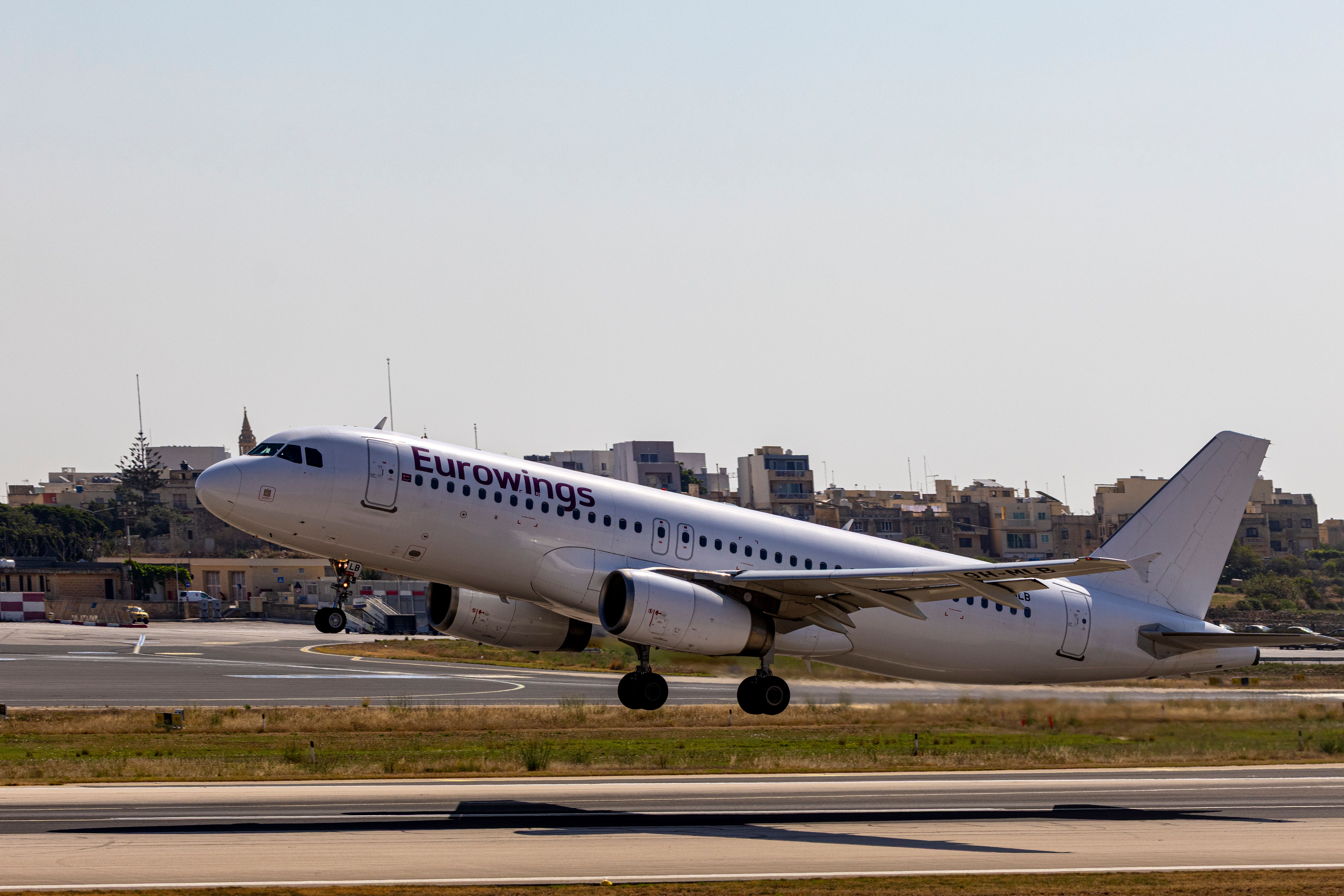 Commercial Airplane Taking Off from Runway · Free Stock Photo