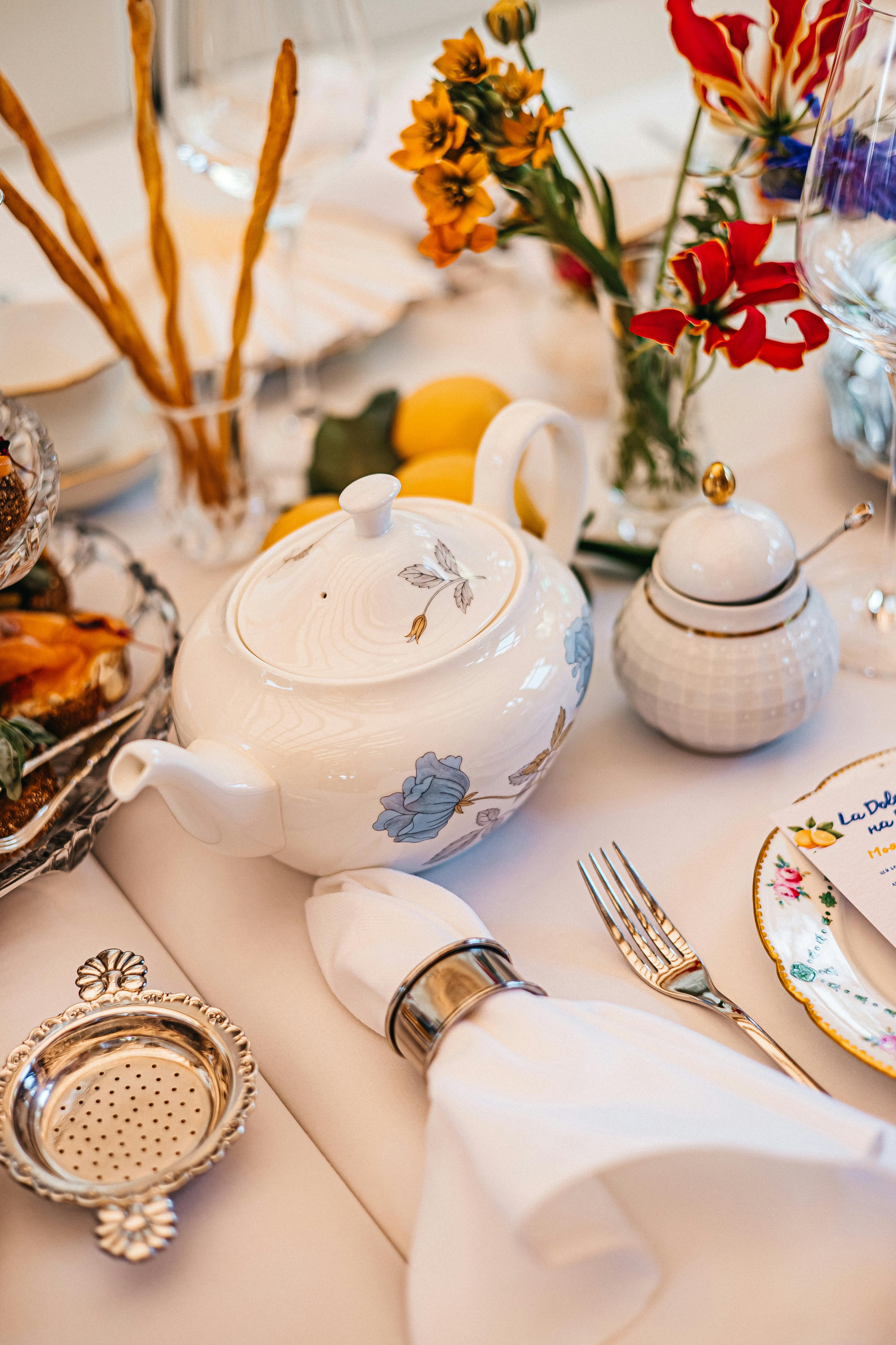 Elegant Afternoon Tea Table Setting with Flowers · Free Stock Photo