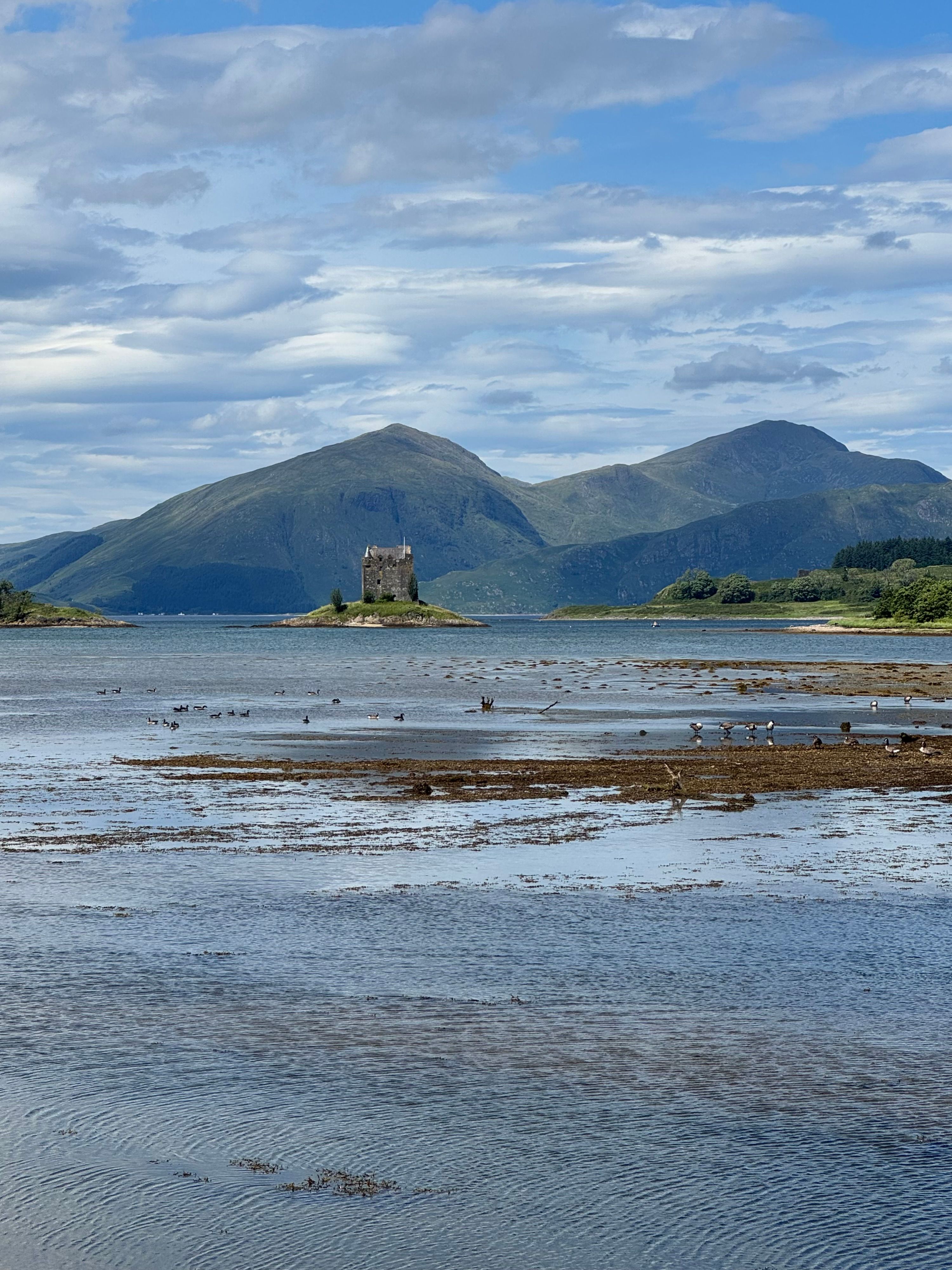 Iconic Castle Stalker in Scenic Scottish Highlands · Free Stock Photo