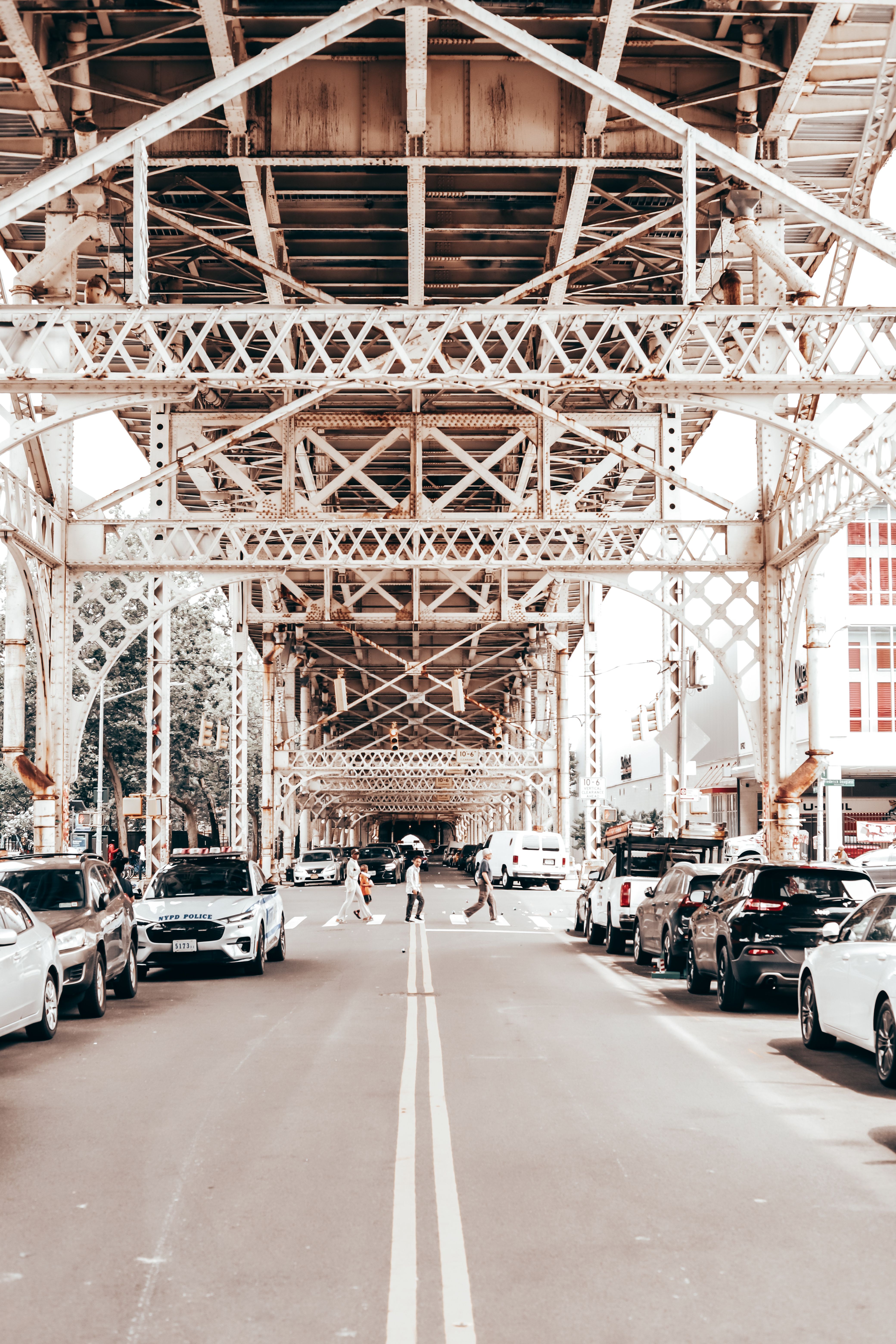 Urban Street Under Elevated Railway in NYC · Free Stock Photo