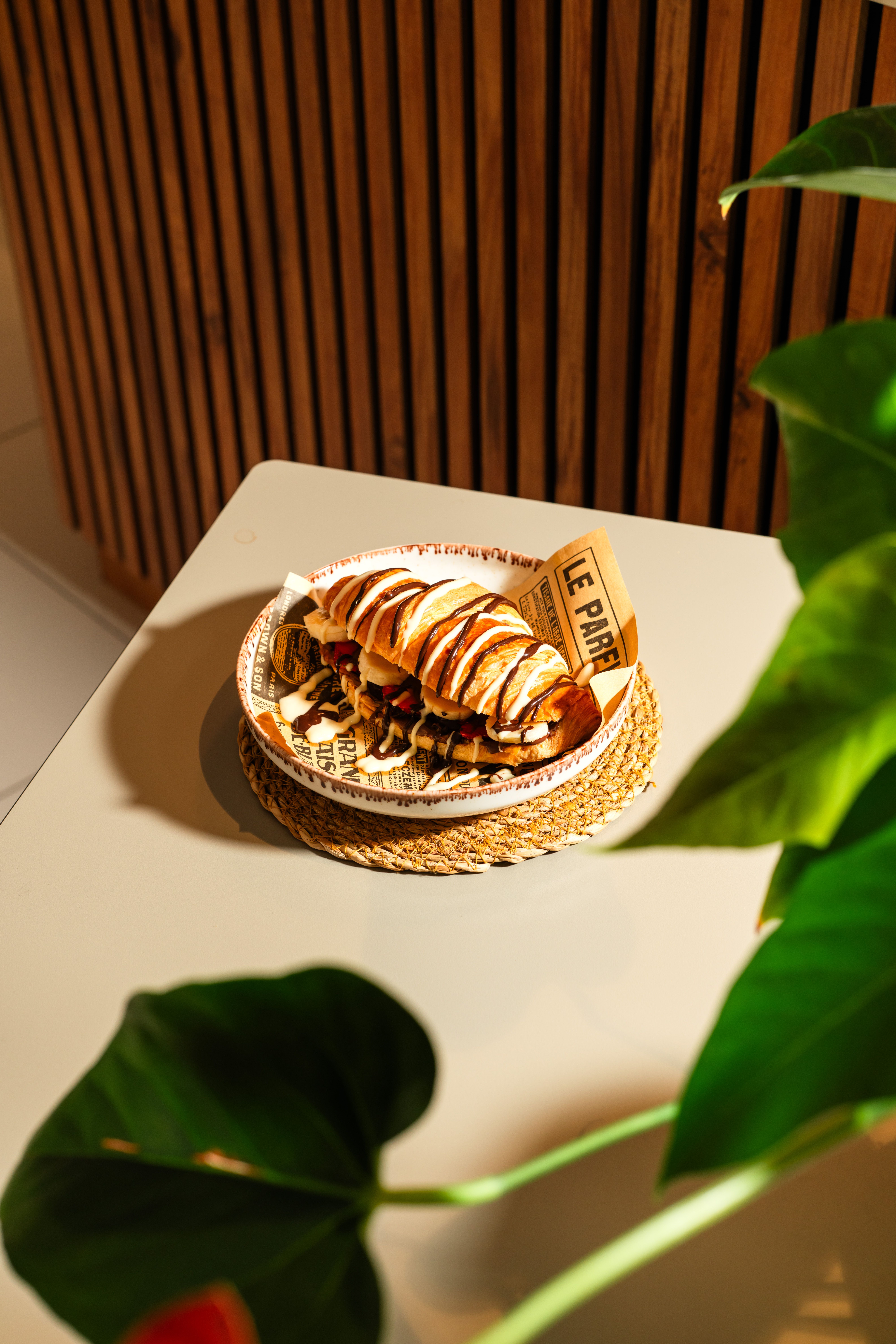Delicious Chocolate Croissant on Plate with Modern Decor · Free Stock Photo