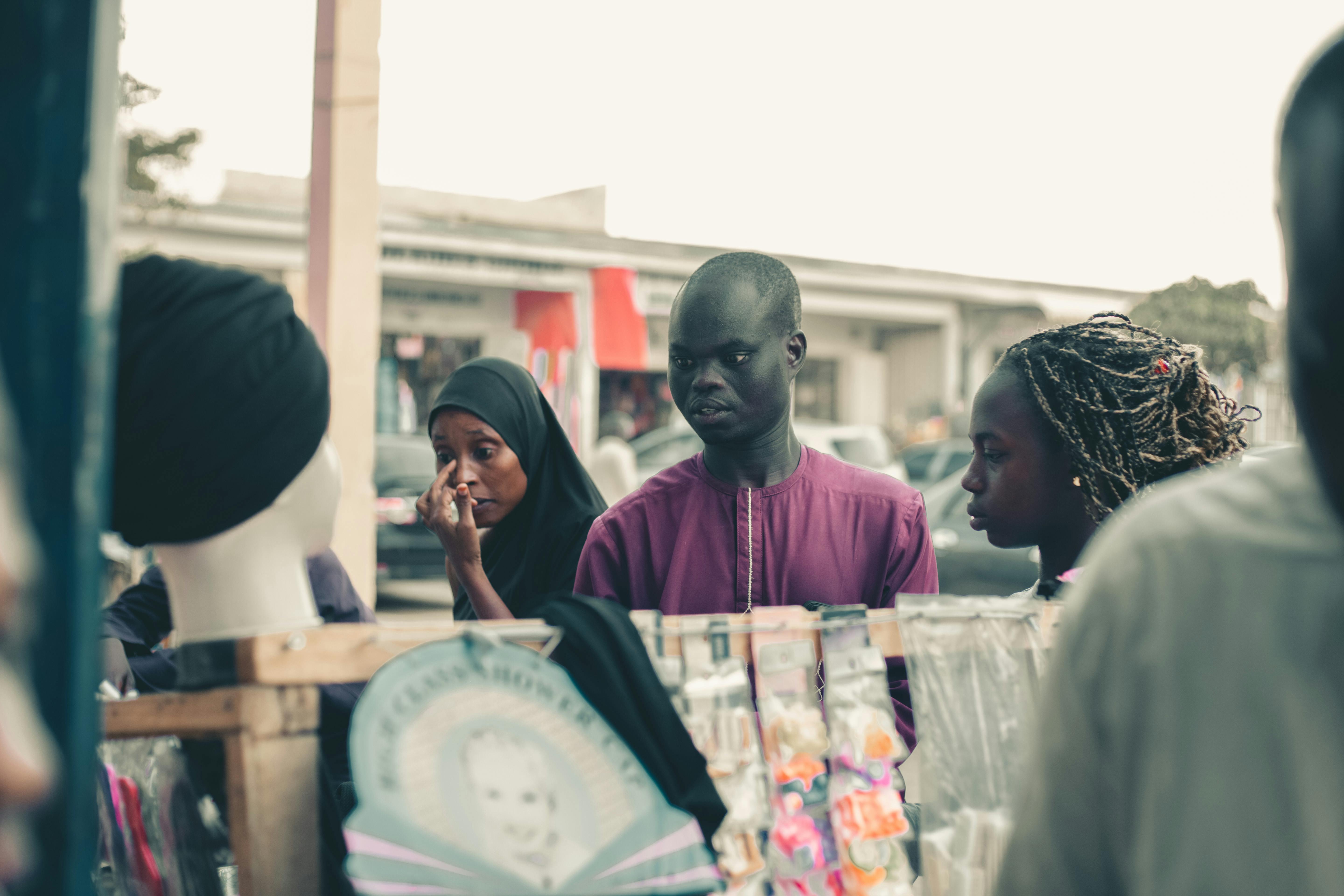 Street Market Scene with People Shopping Outdoors · Free Stock Photo