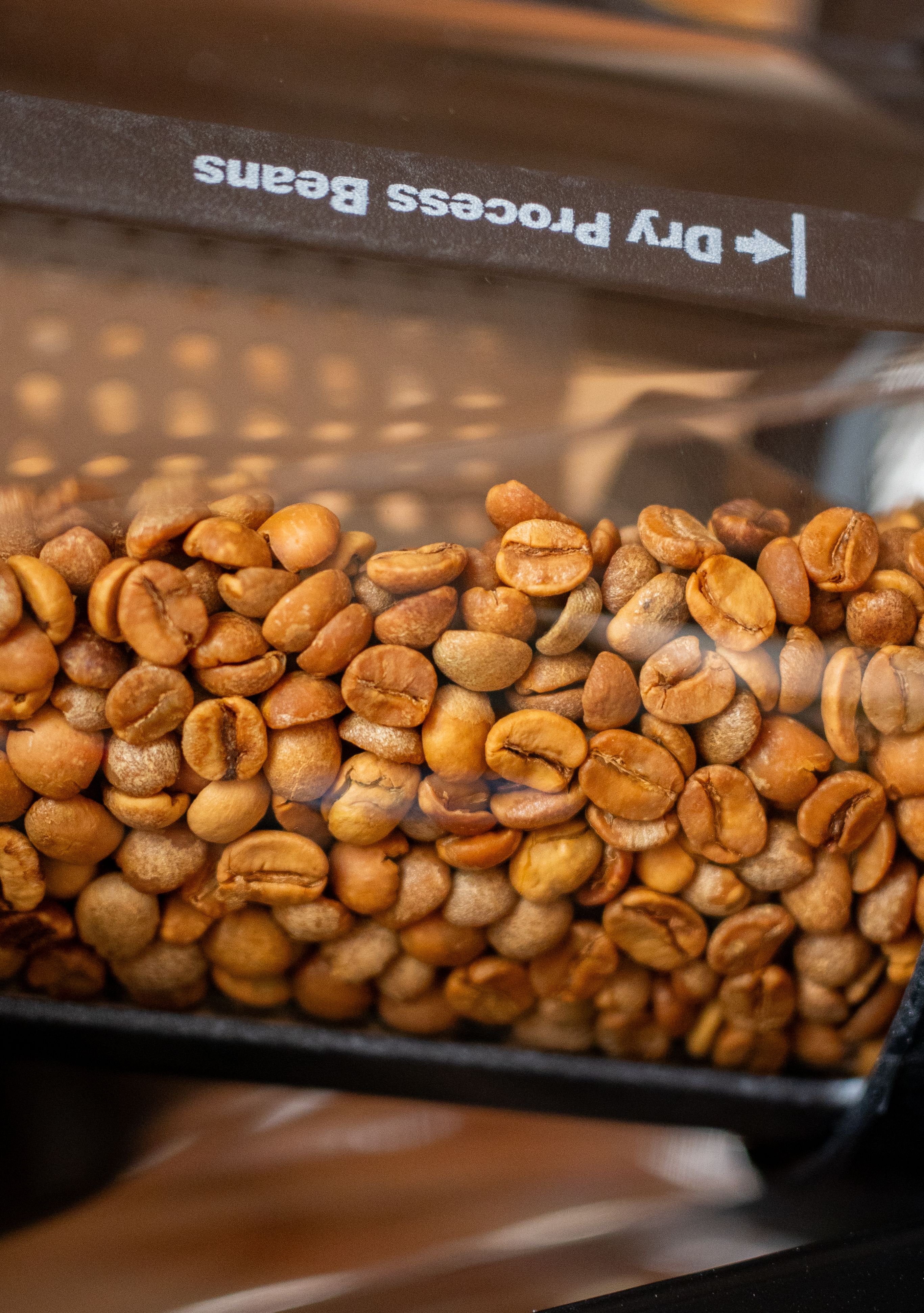 High-Quality Close-Up of Dry Process Coffee Beans · Free Stock Photo