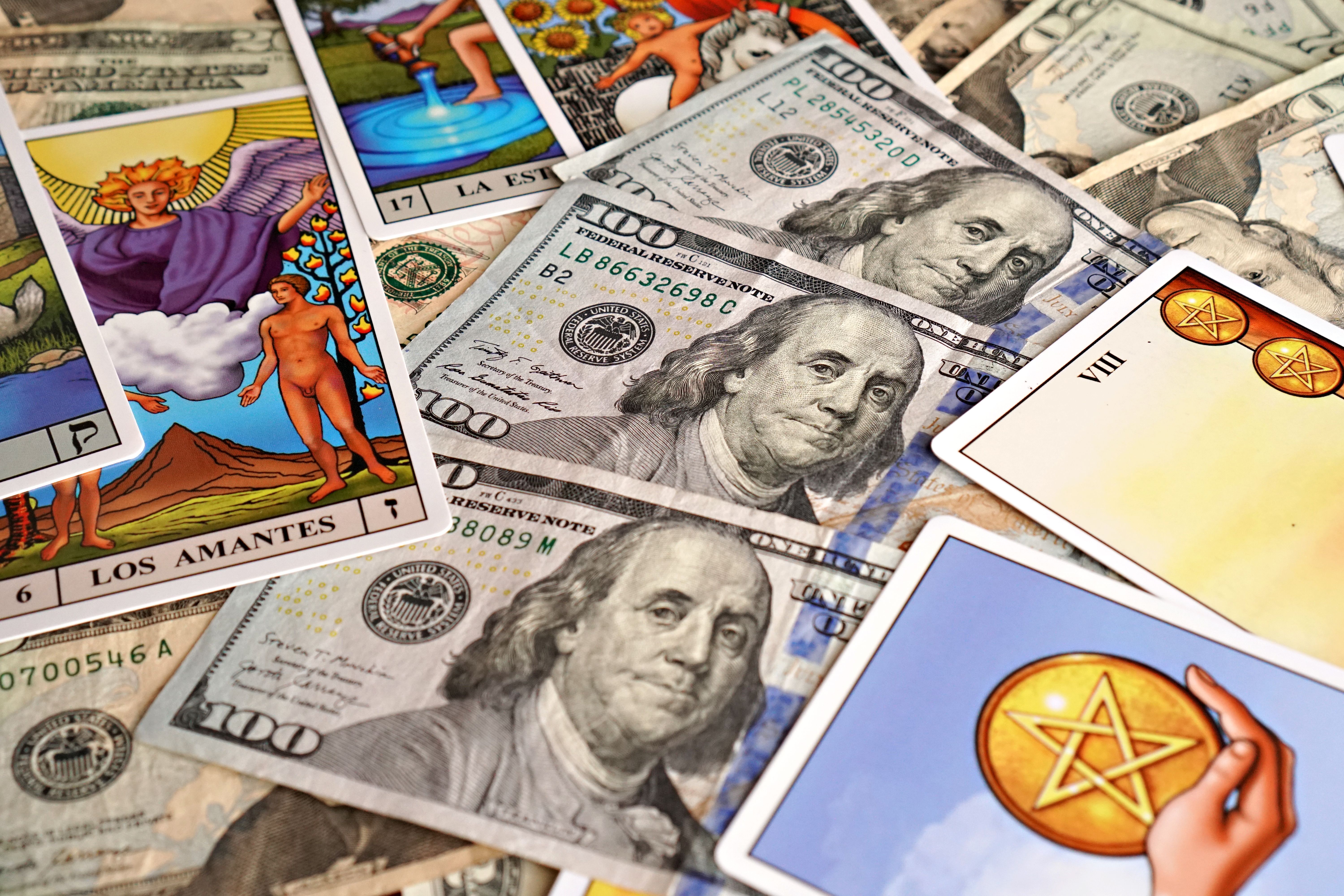 Tarot Cards and Currency Imagery · Free Stock Photo
