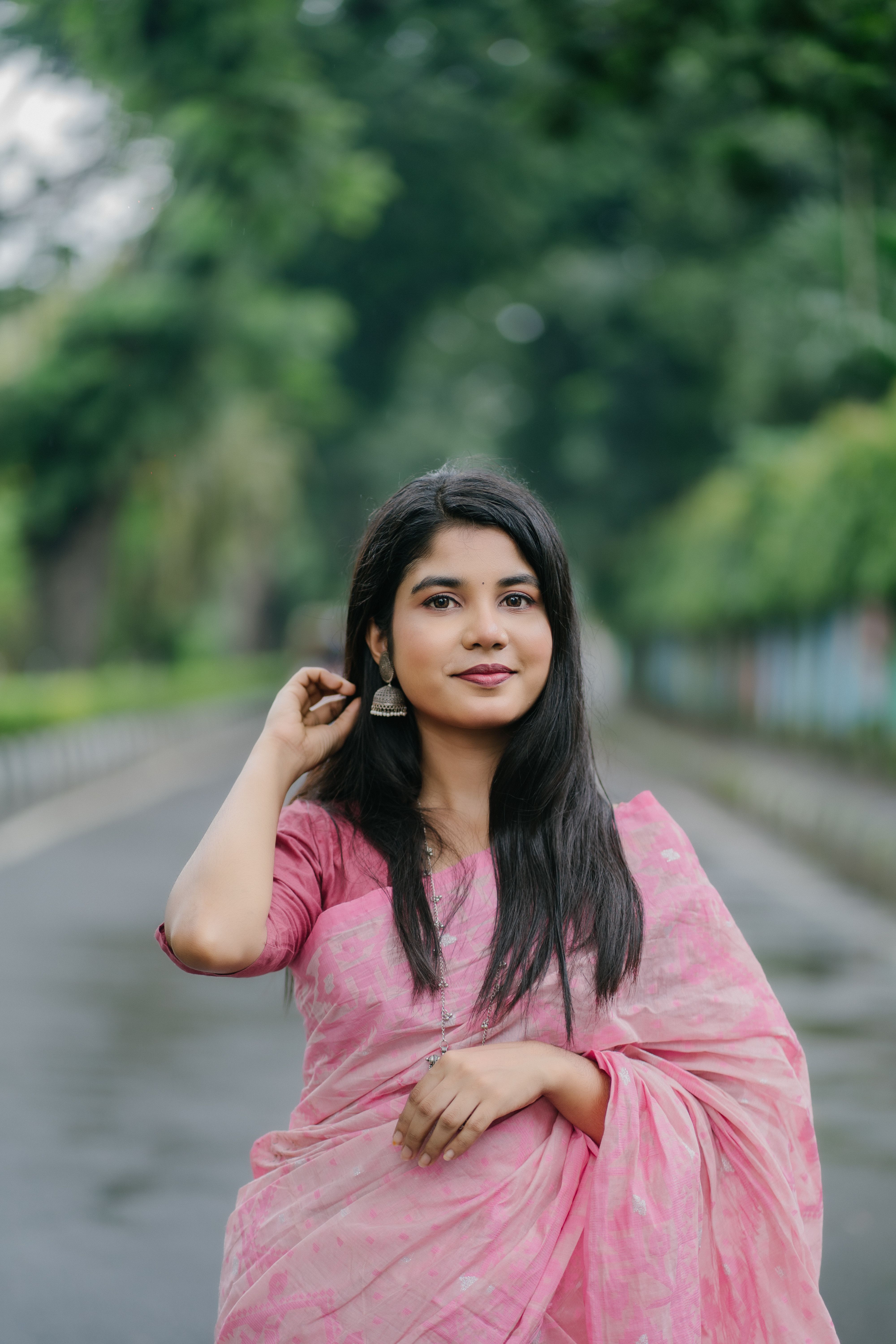 Young Woman in Pink Saree on a Street · Free Stock Photo