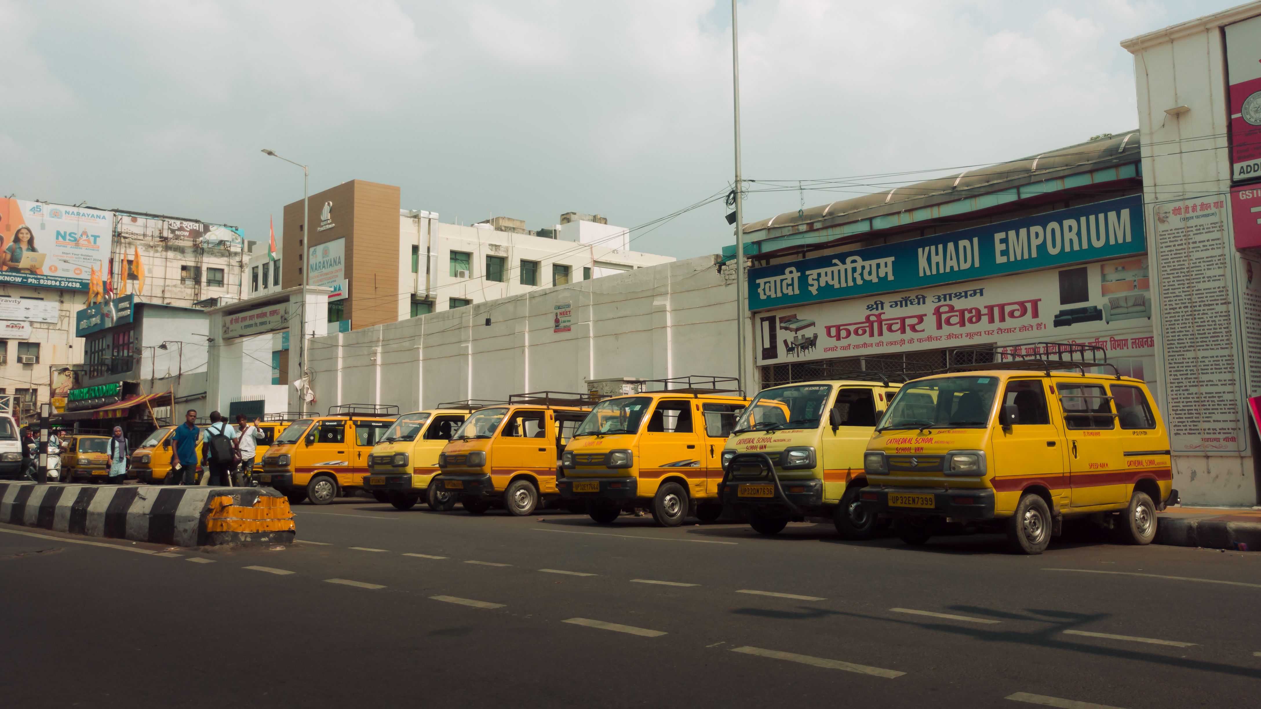 Yellow Cars Lined Up in Lucknow Street · Free Stock Photo