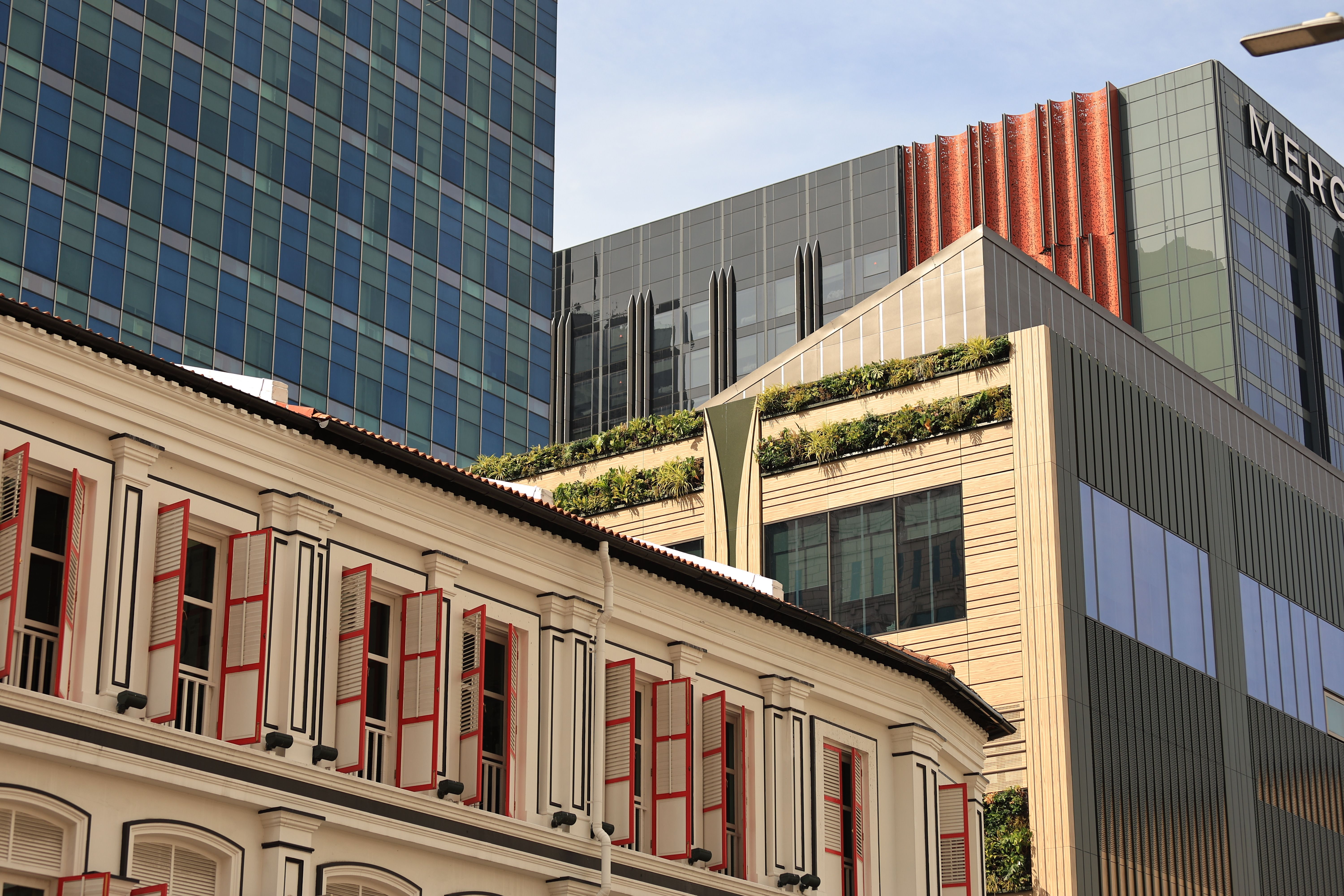 Modern and Traditional Architecture Contrast · Free Stock Photo