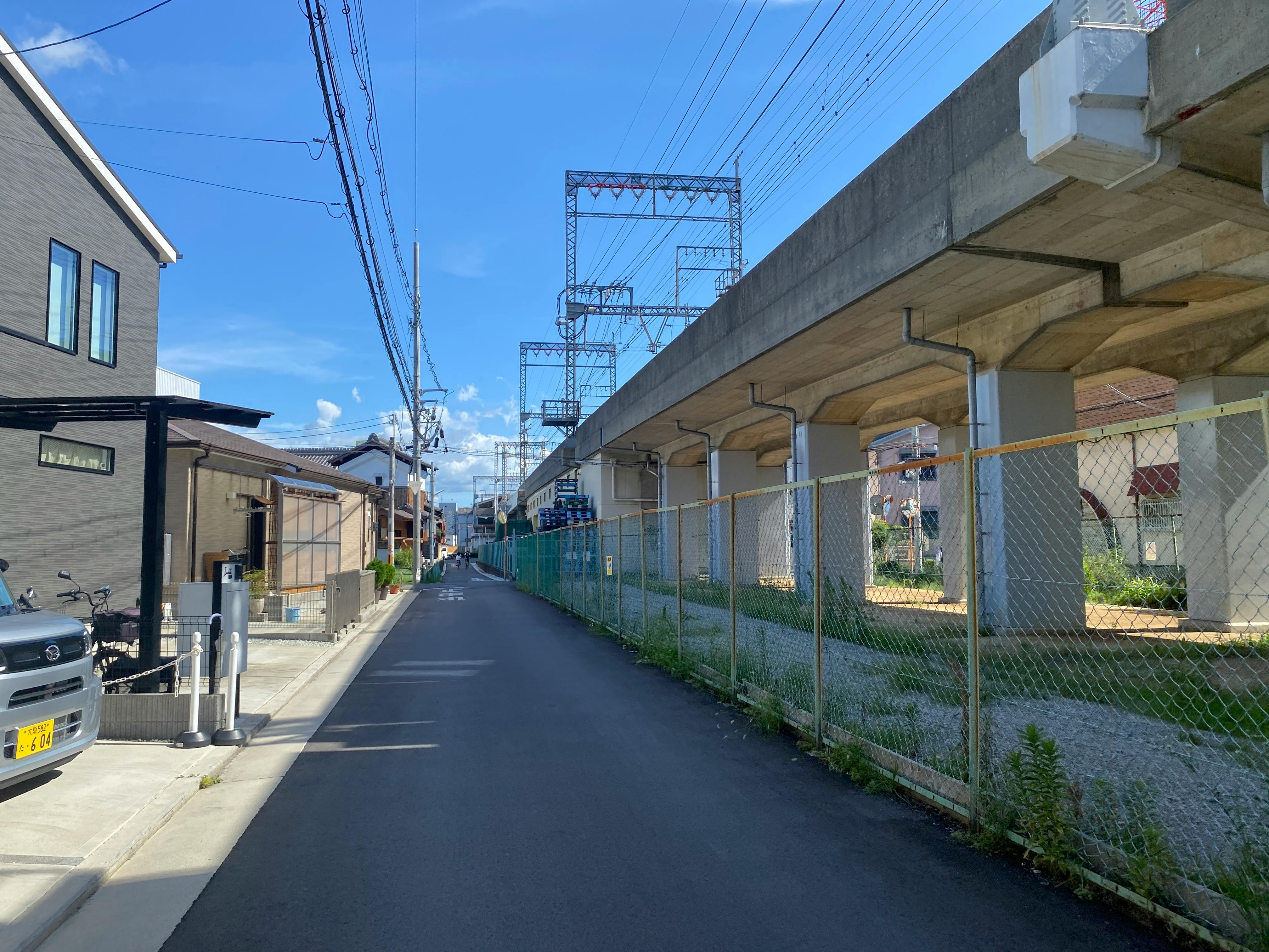 Suburban Japanese Street with Elevated Railway · Free Stock Photo