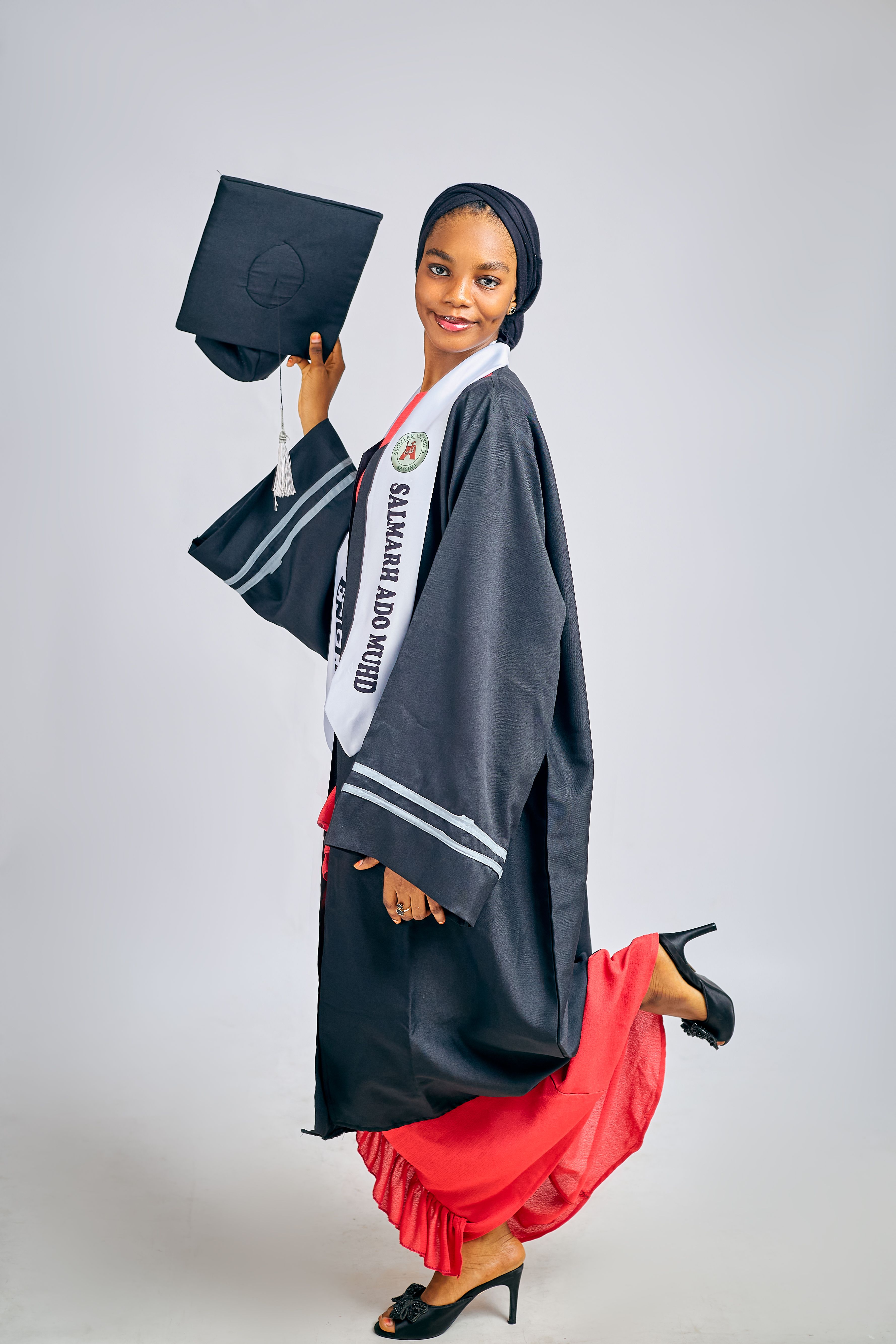 Nigerian Graduate Celebrating in Cap and Gown · Free Stock Photo