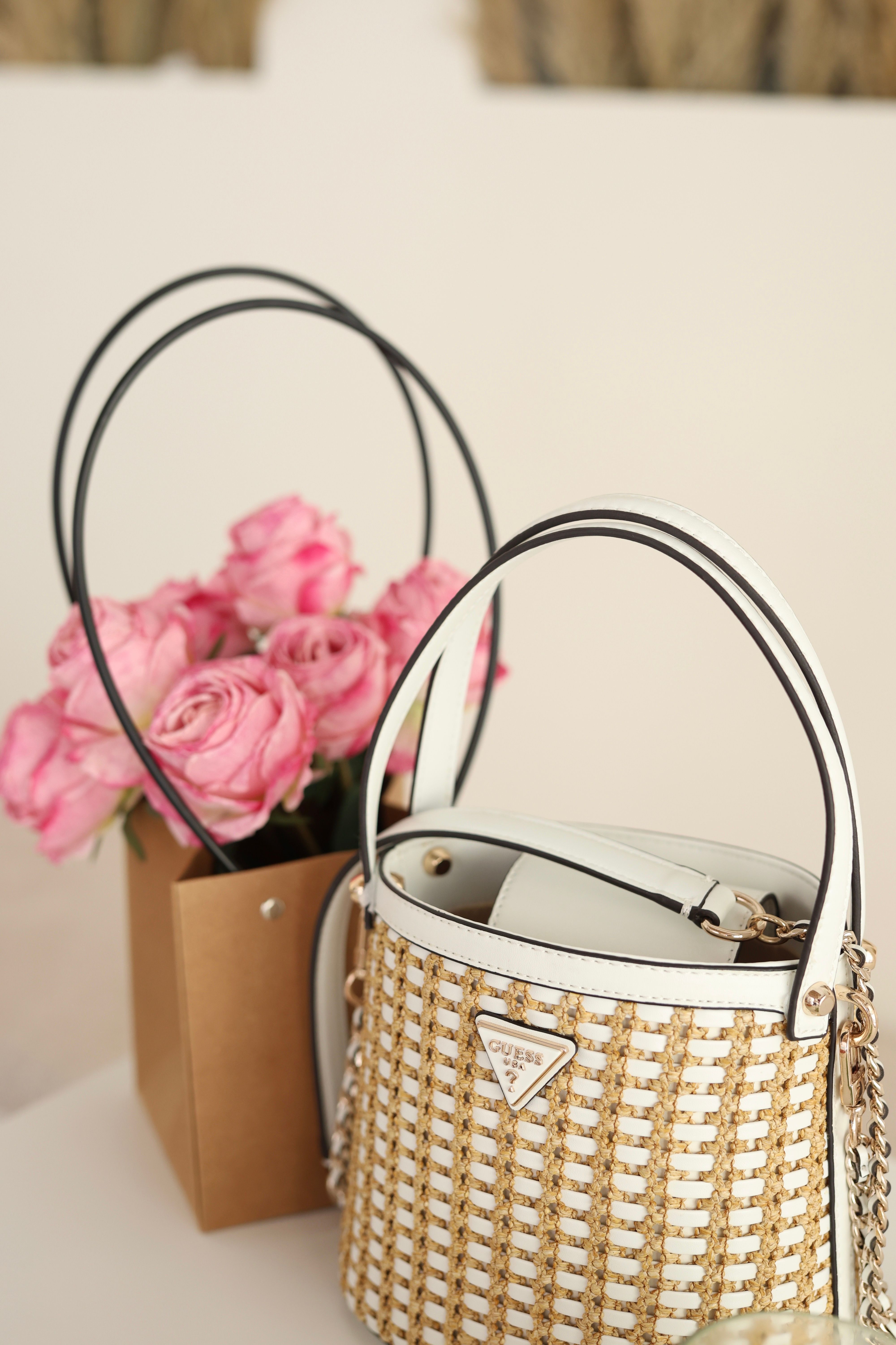 Elegant Designer Handbag with Pink Roses · Free Stock Photo
