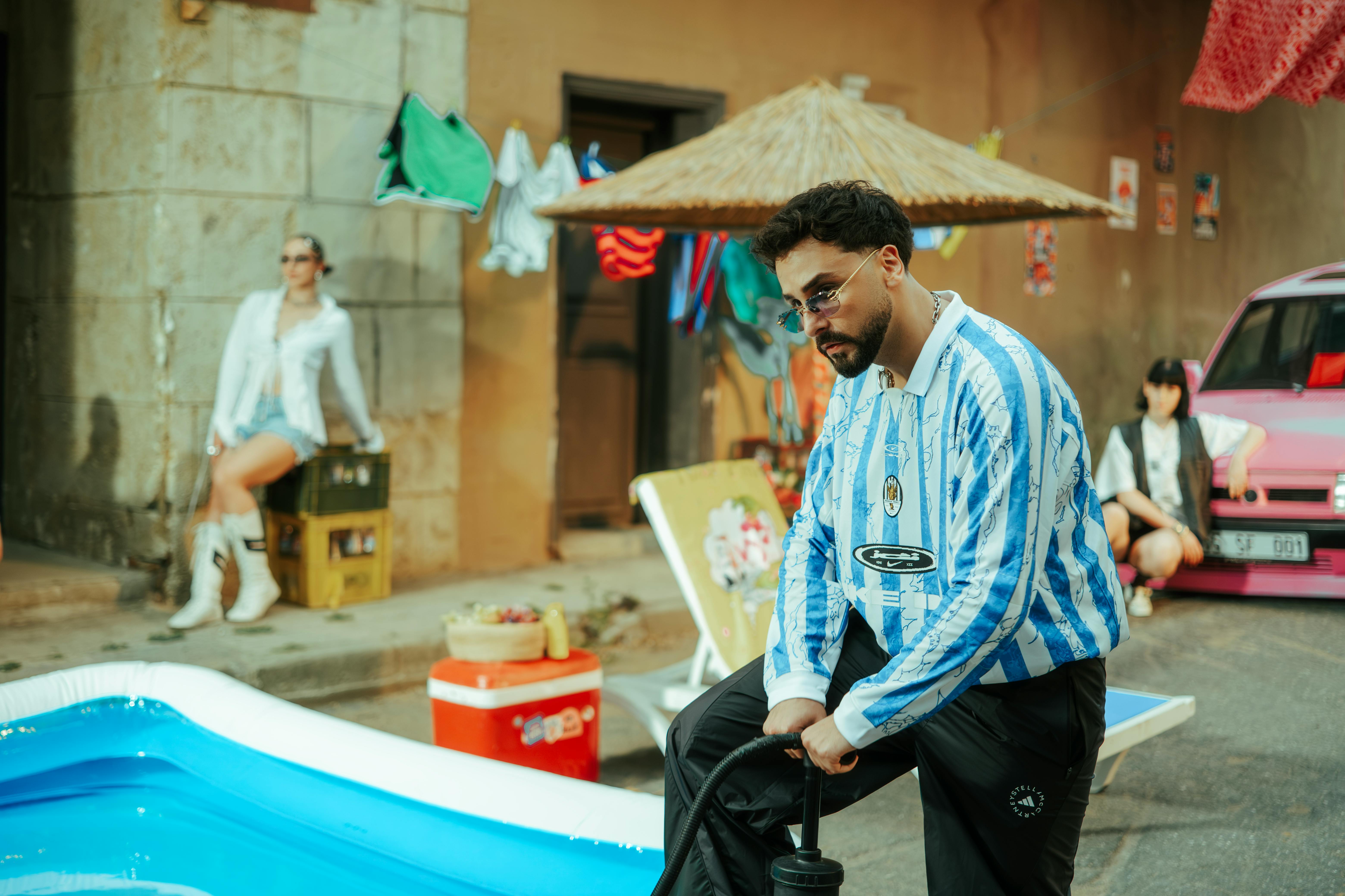 Urban summer street scene with pool party vibes · Free Stock Photo