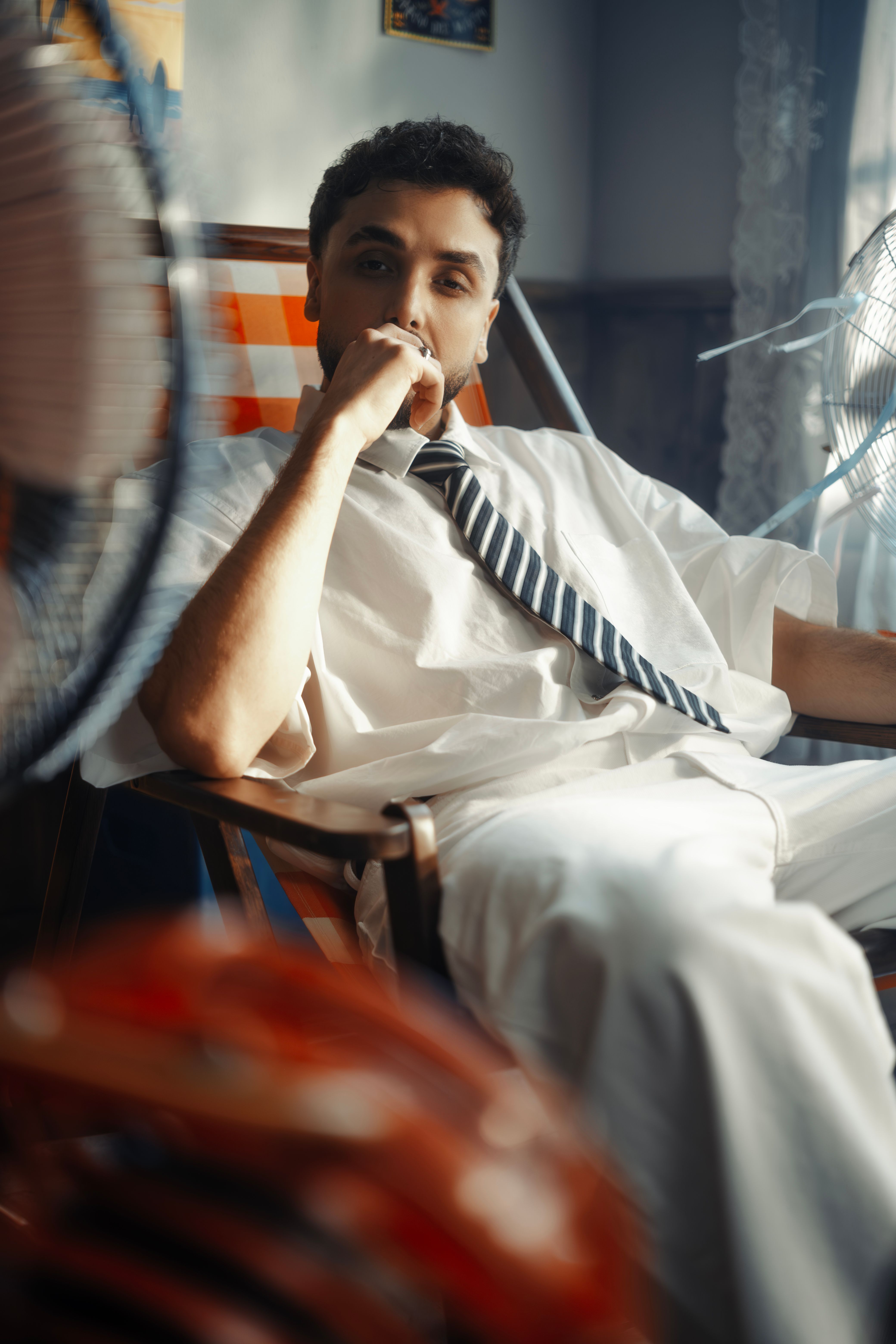 Casual Indoor Portrait with Fan and Sunlight · Free Stock Photo